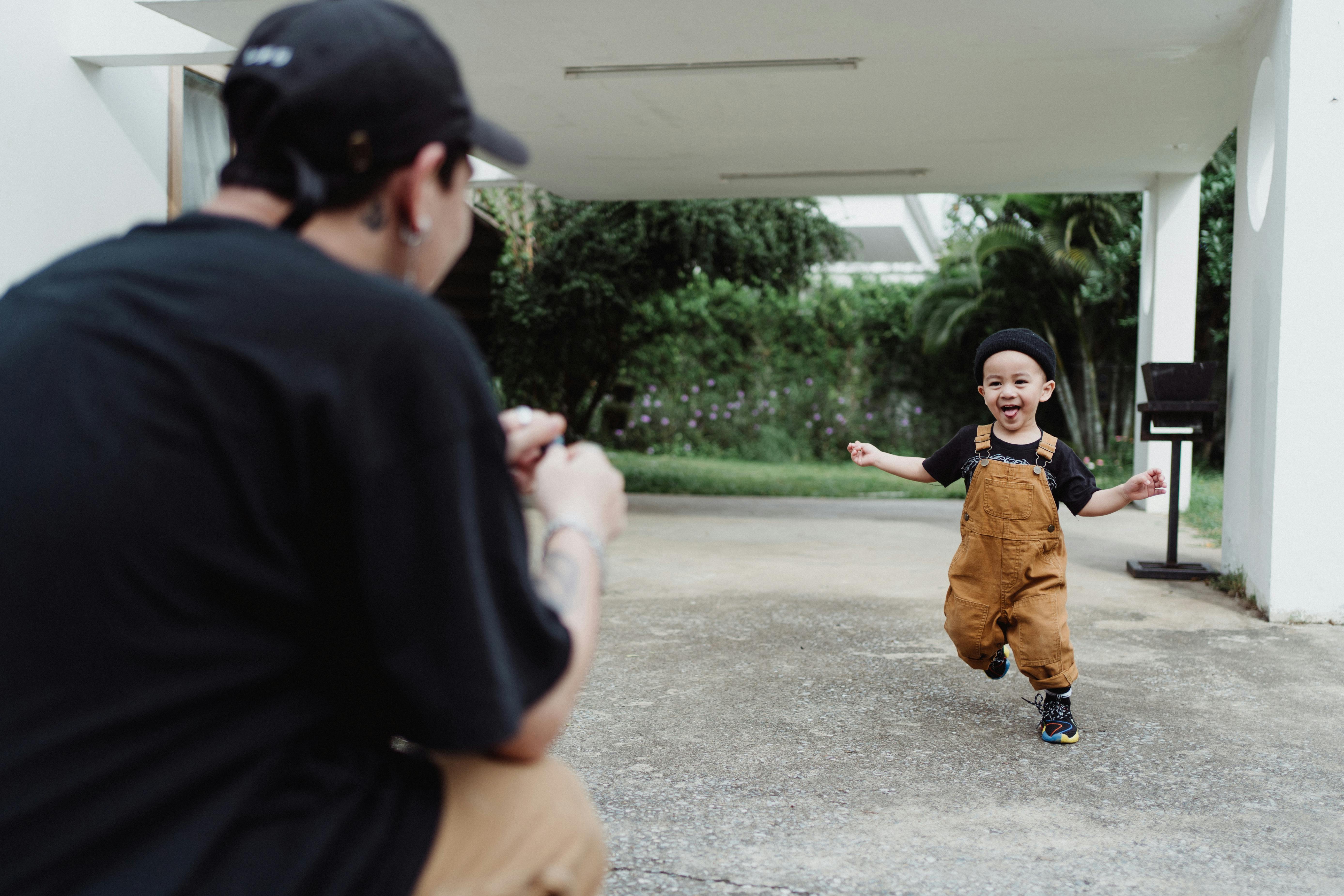 Happy Baby Boy Running Towards His Father · Free Stock Photo