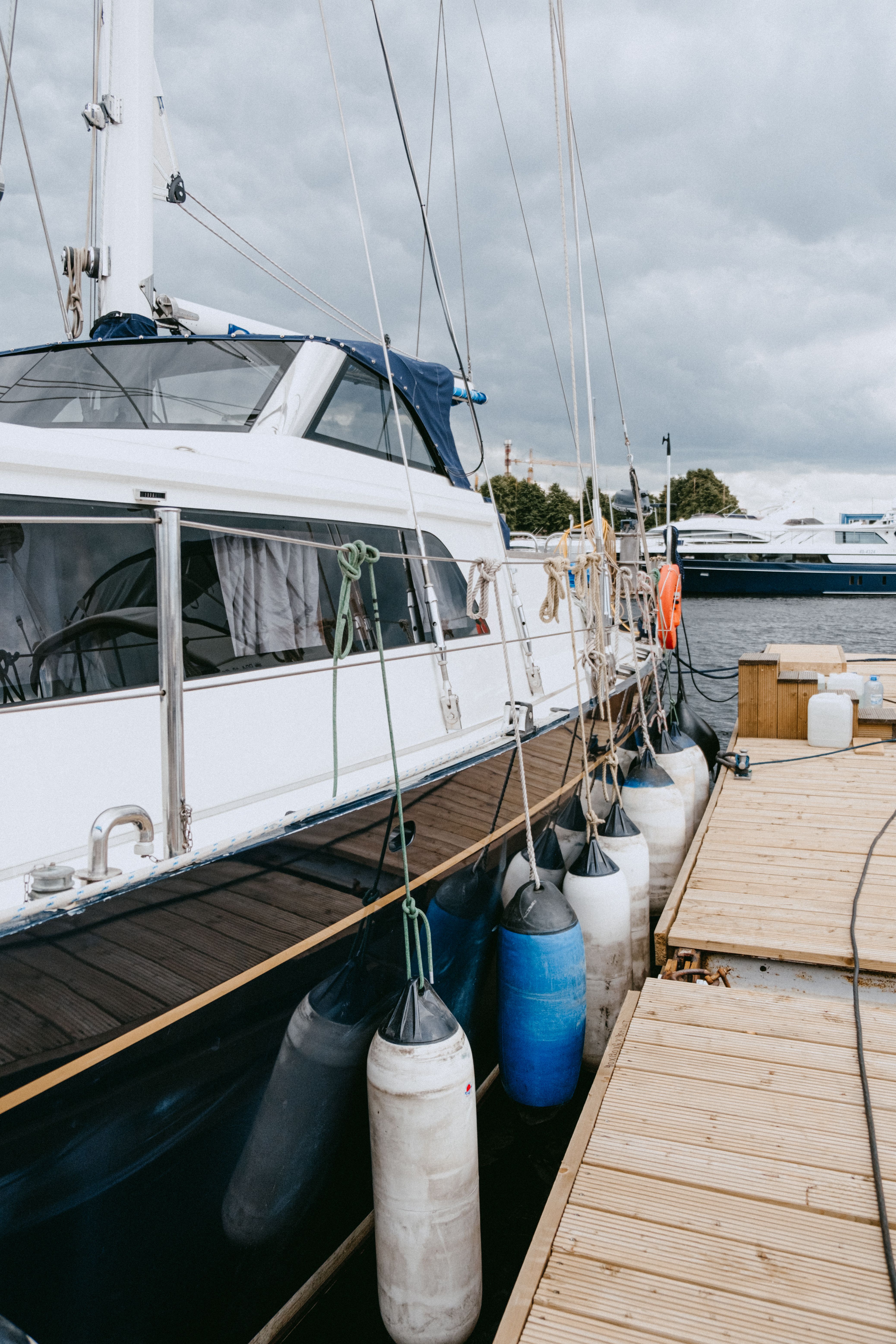 White and Blue Boat on Dock · Free Stock Photo