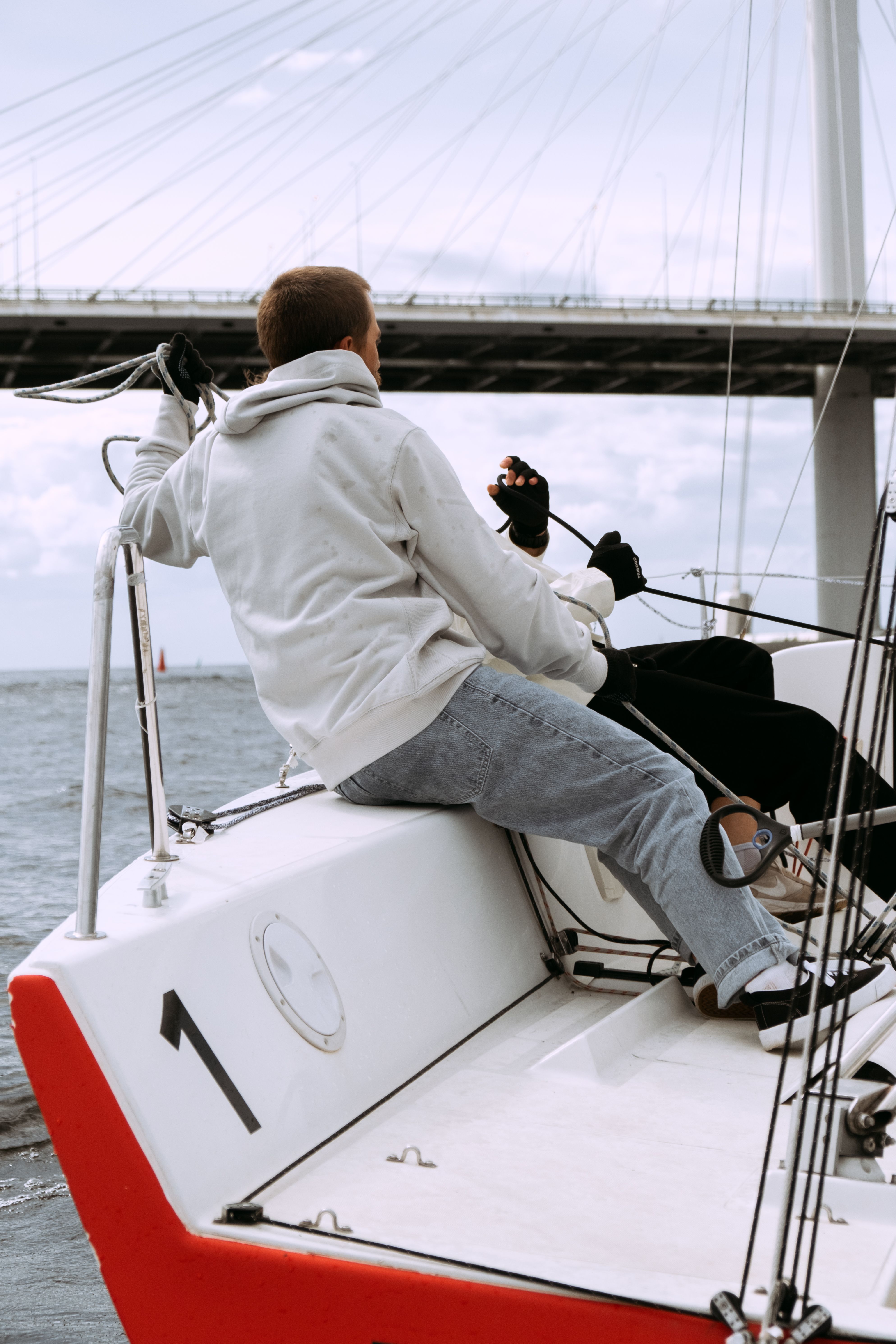 Man Standing On The Edge Of Boat · Free Stock Photo