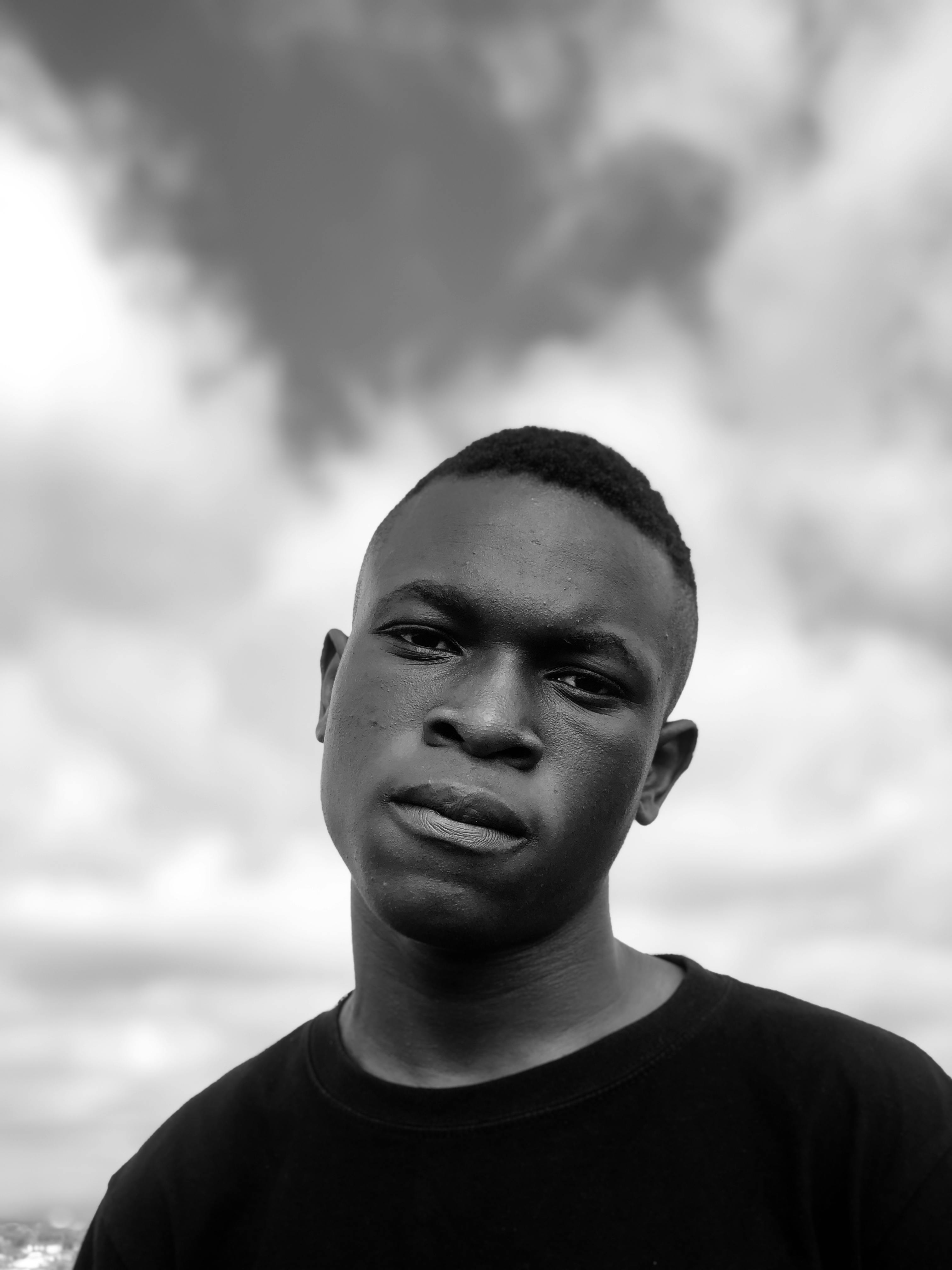 Grayscale Photo of Man Looking at Camera · Free Stock Photo