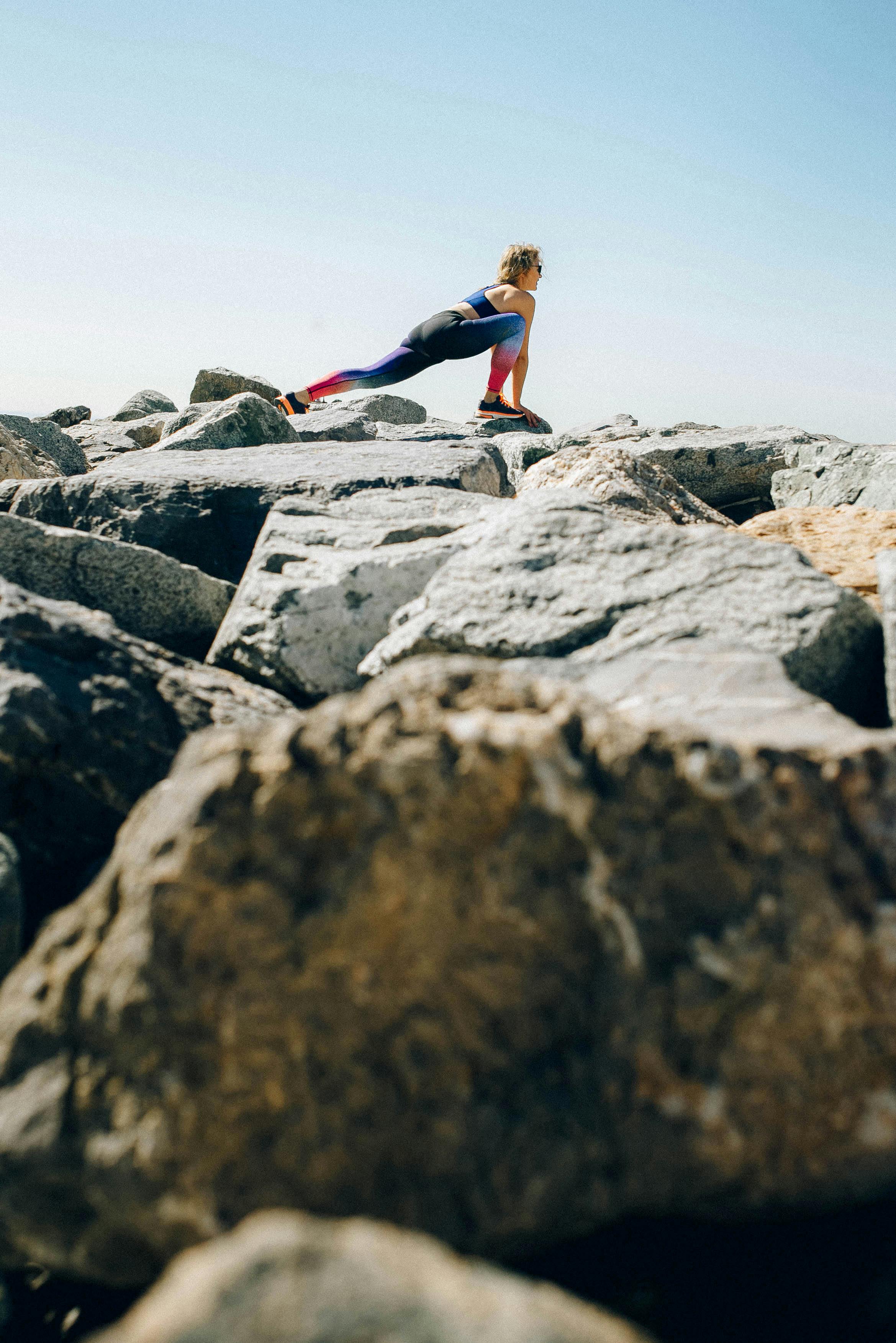 Person Sitting on Rock on Mountain Top Overlooking Valley · Free Stock ...