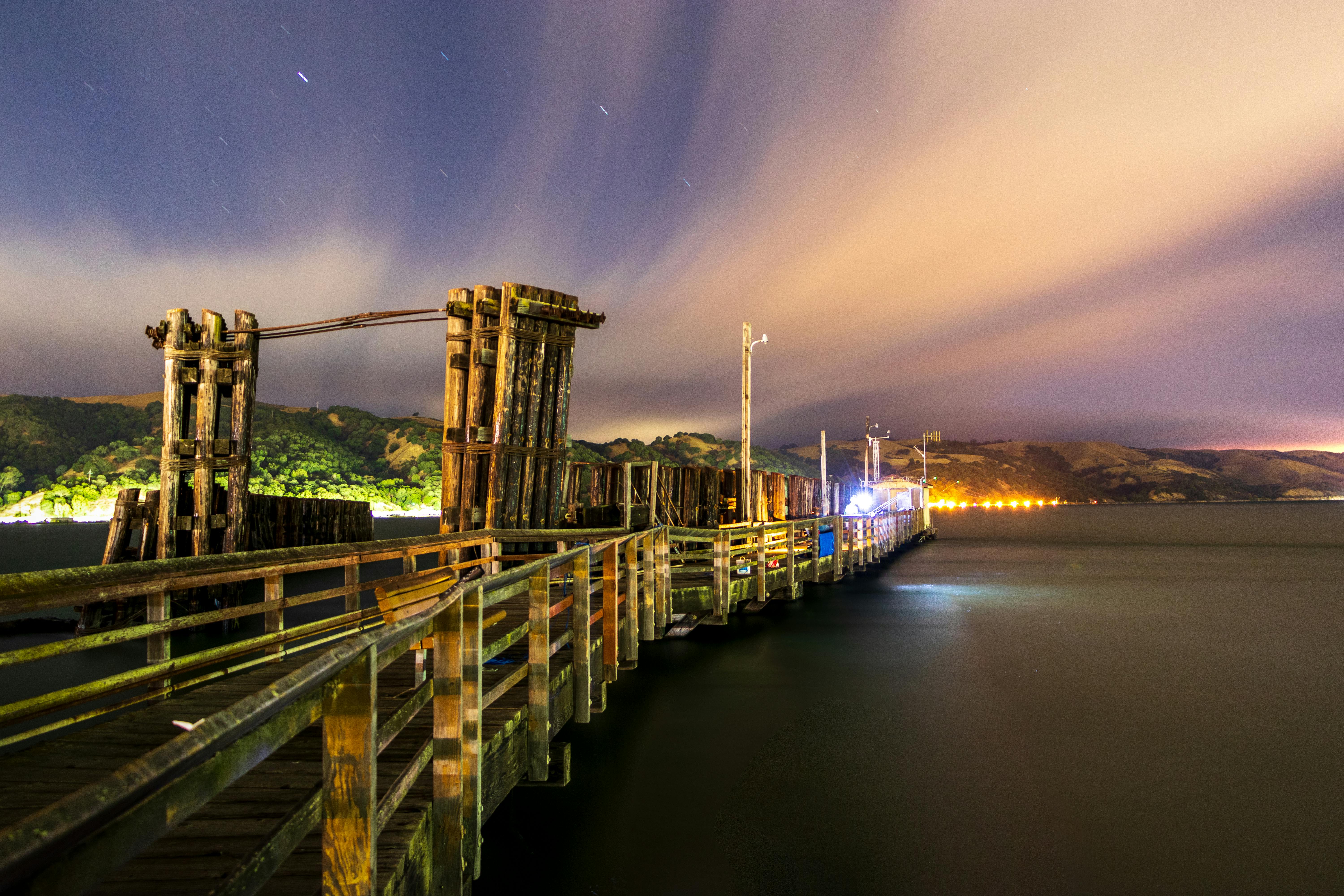 Old Wooden Dock on Water During Night Time · Free Stock Photo