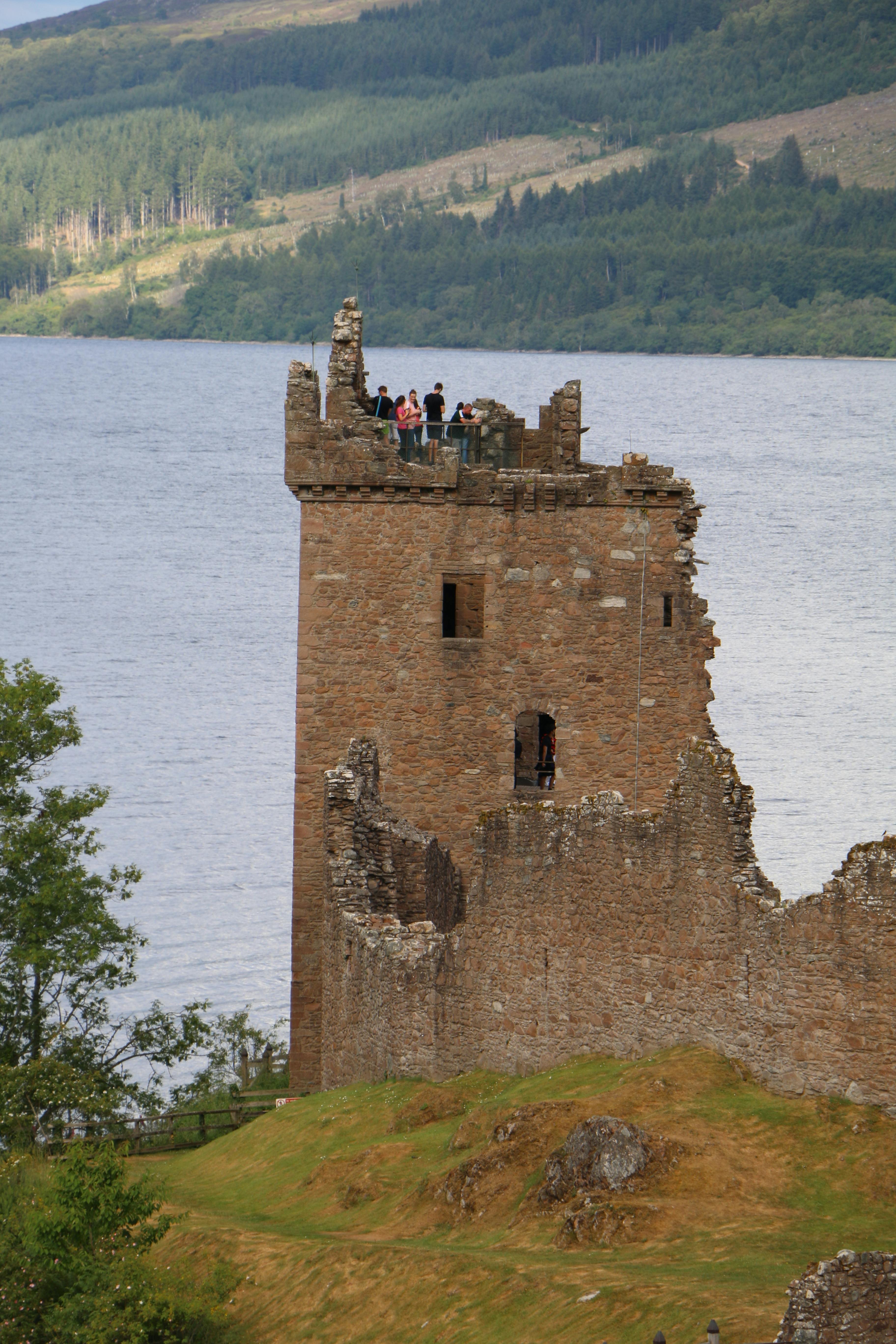 Concrete Castle Beside Body Of Water · Free Stock Photo