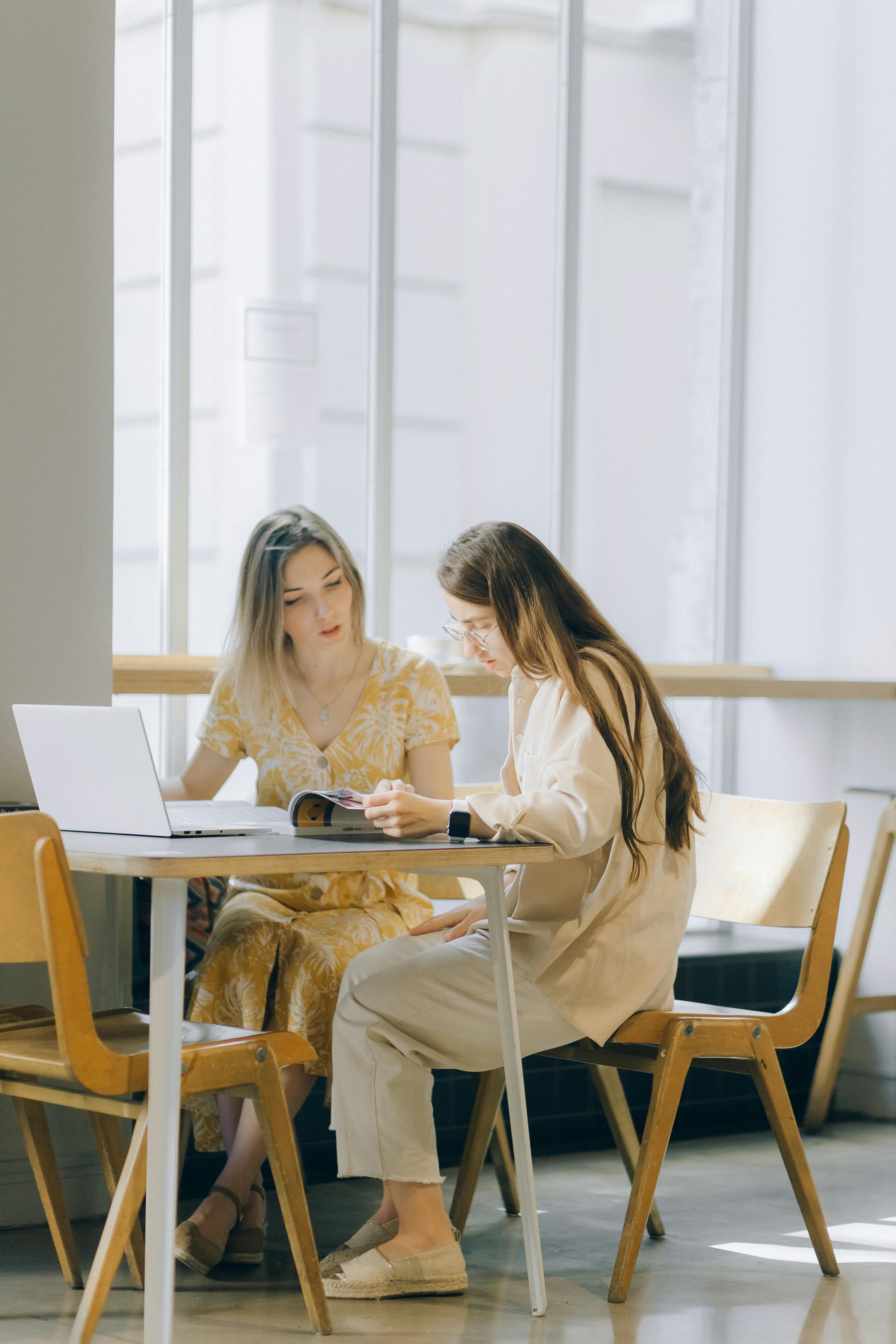 Women Doing Research Together · Free Stock Photo