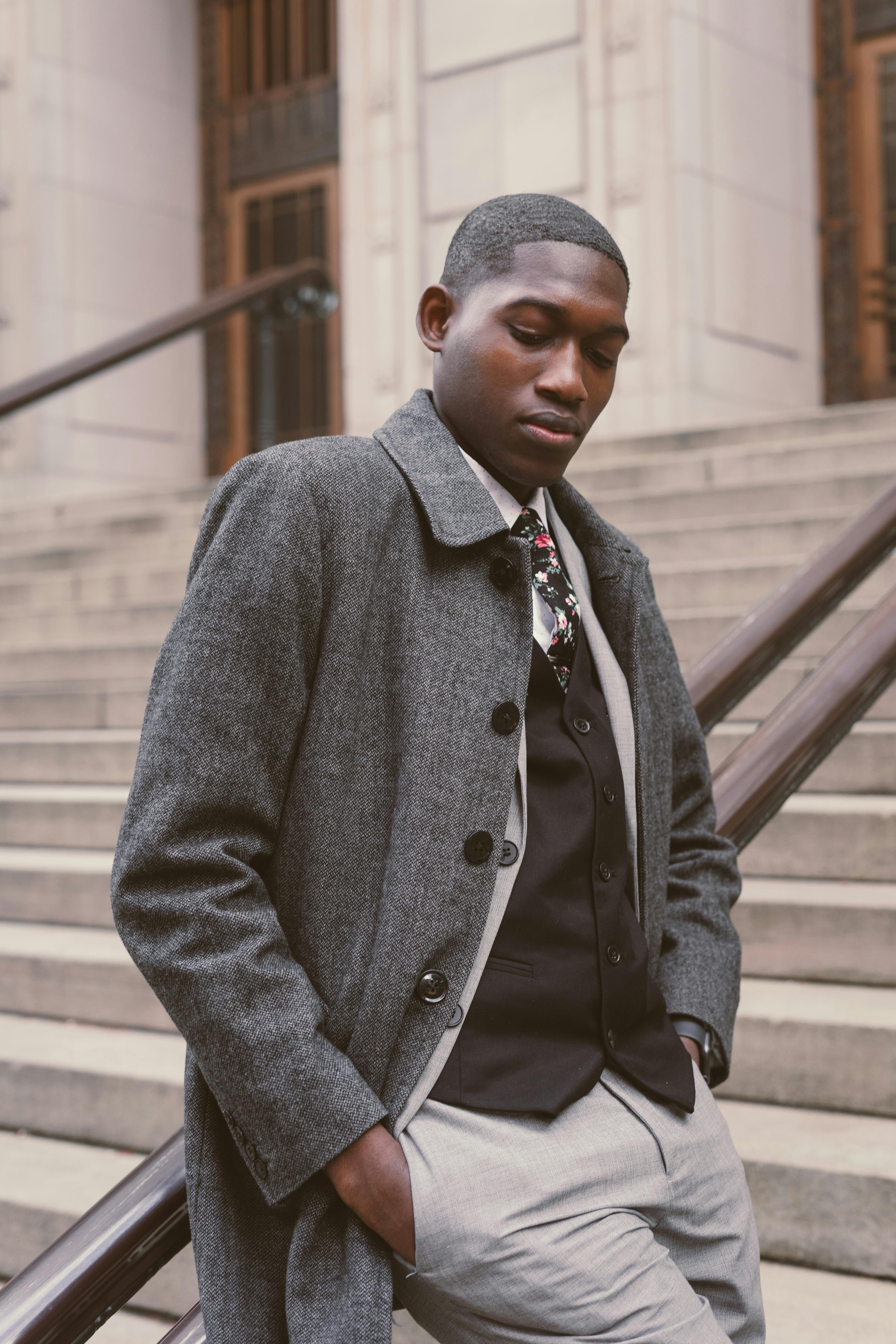 Confident black man on stairs · Free Stock Photo
