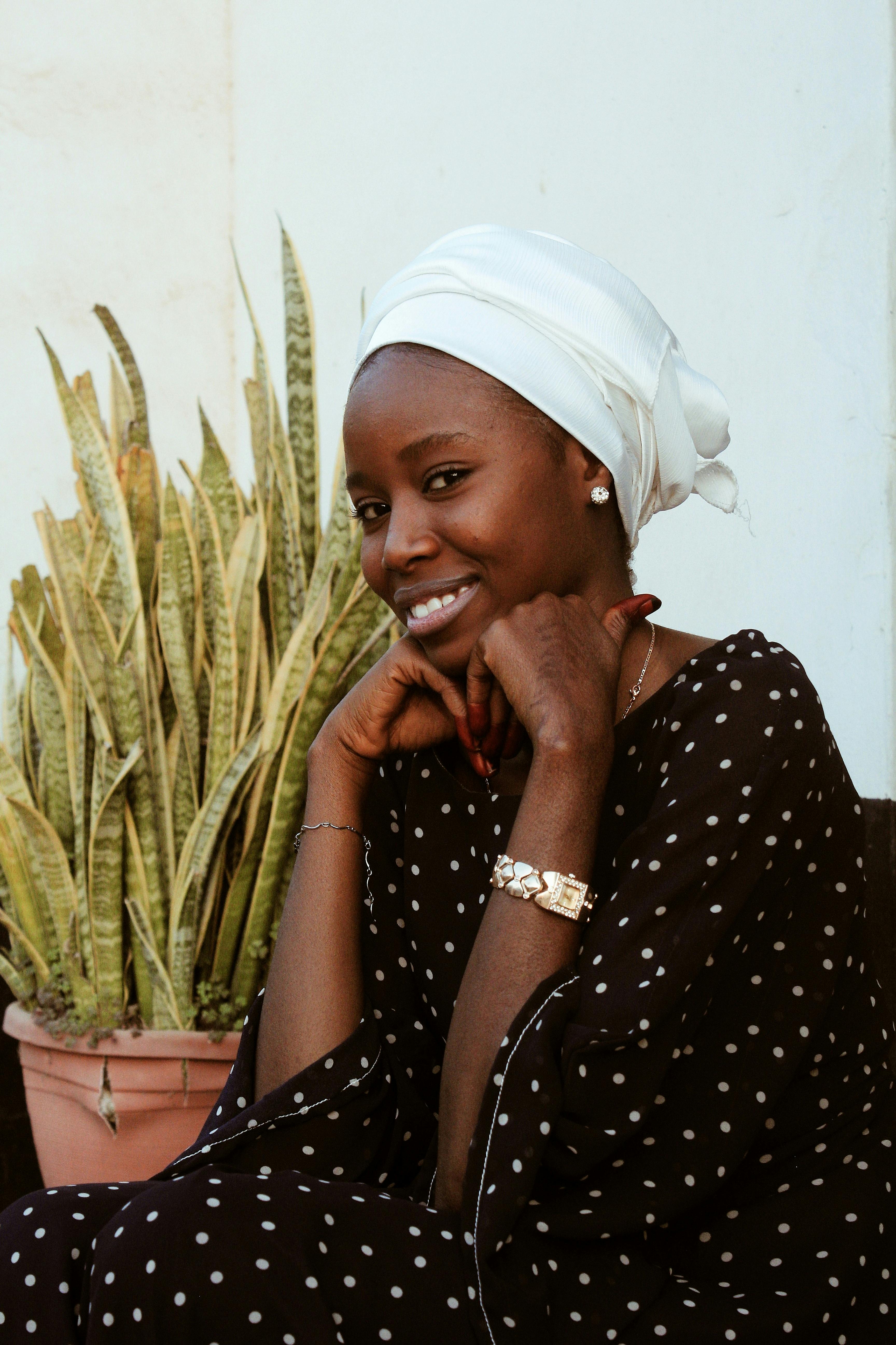 Playful chubby woman in colorful shirt · Free Stock Photo
