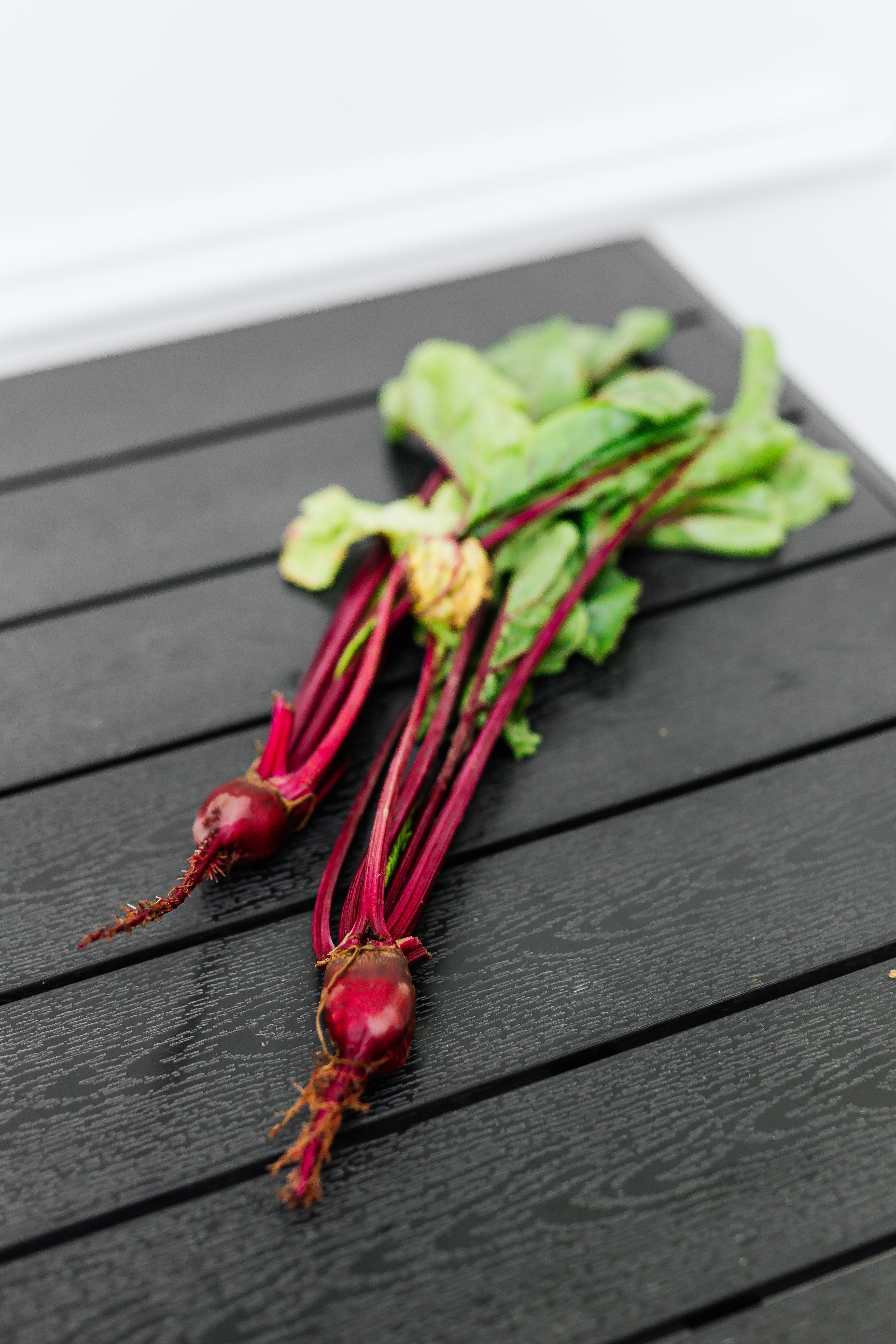 Beetroot Plants on Brown Wooden Table · Free Stock Photo