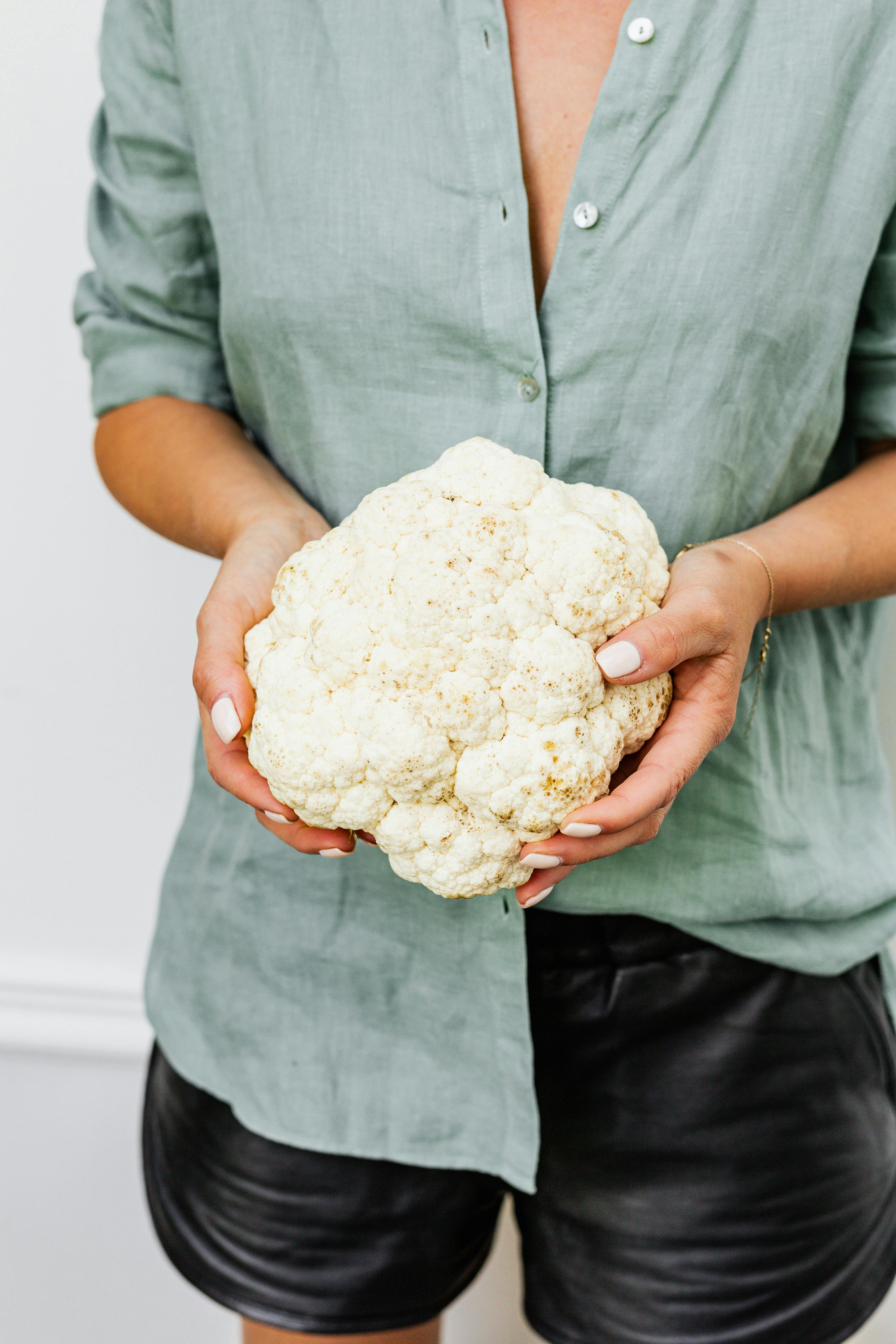 Person Holding Cauliflower · Free Stock Photo