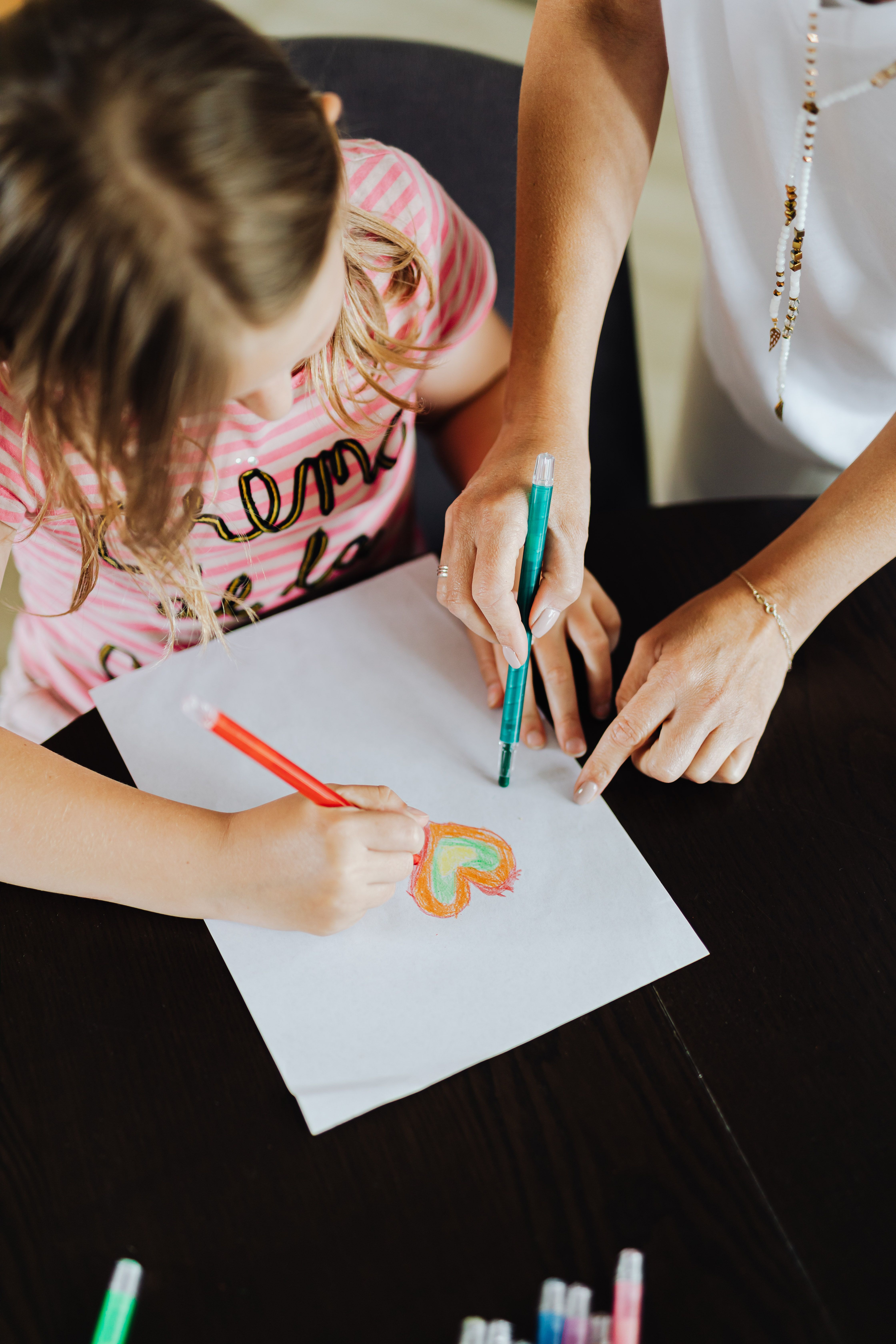 Woman Teaching the Blonde Girl How to Draw · Free Stock Photo