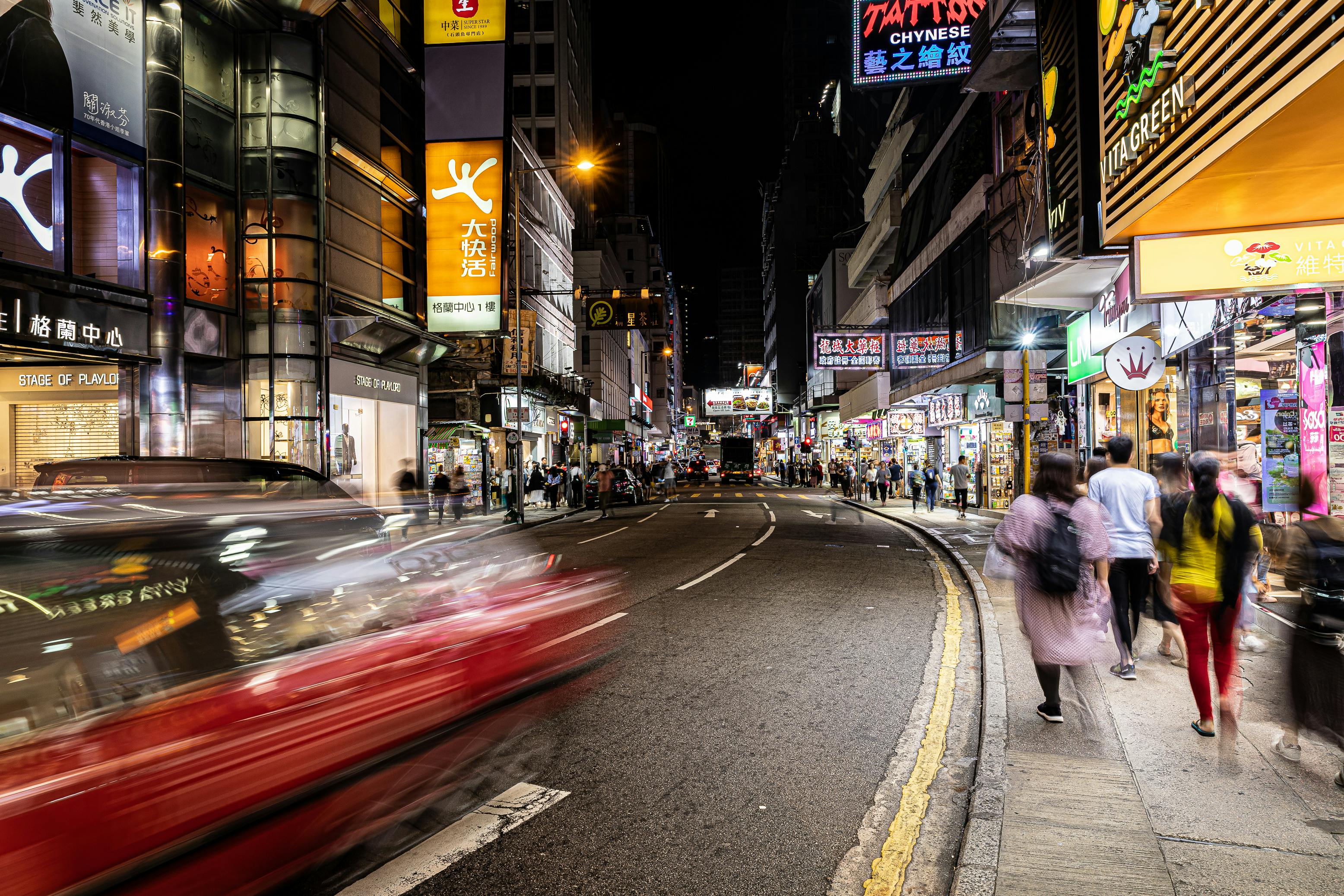 People Walking on the Street at Night · Free Stock Photo