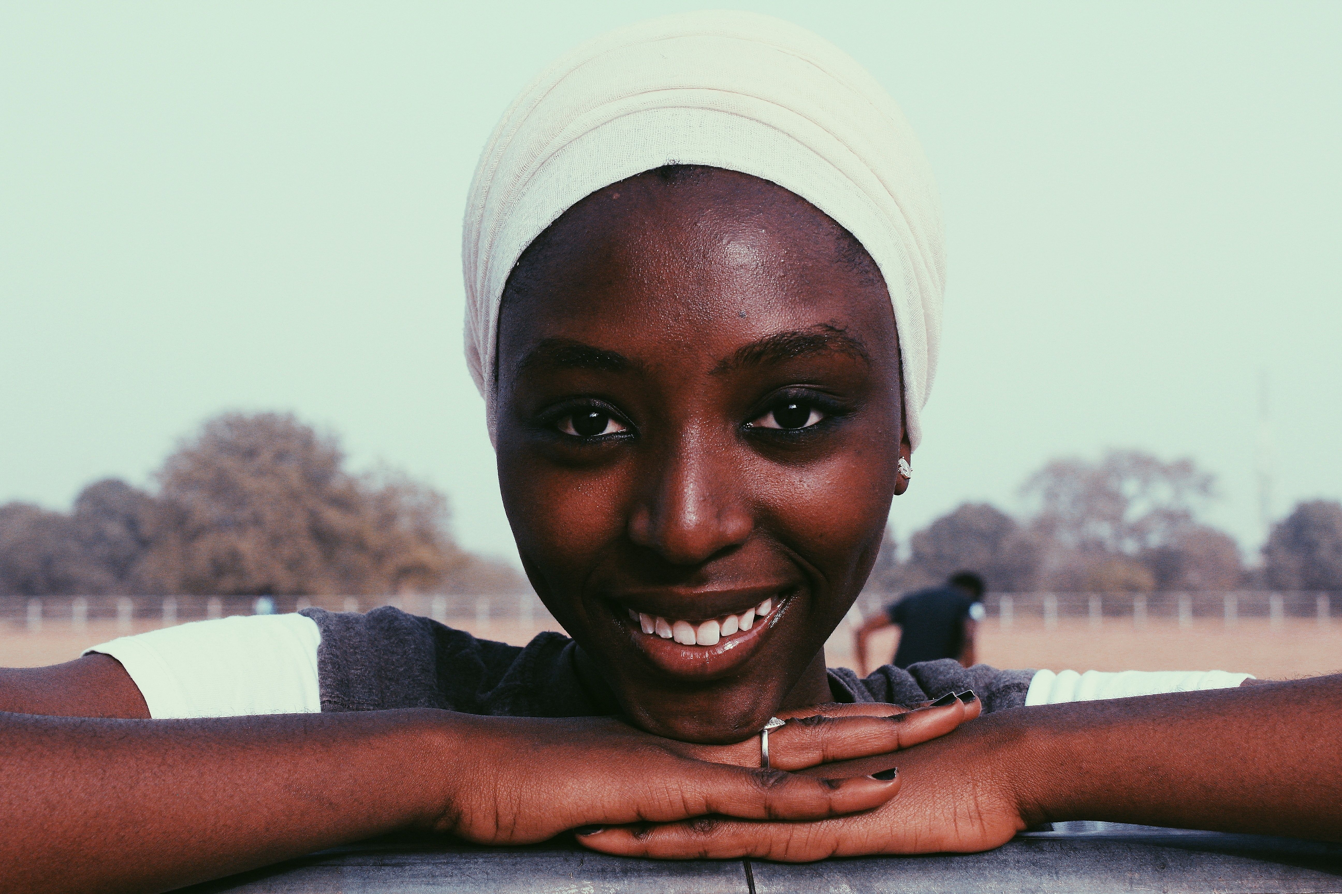Cheerful black woman on street · Free Stock Photo