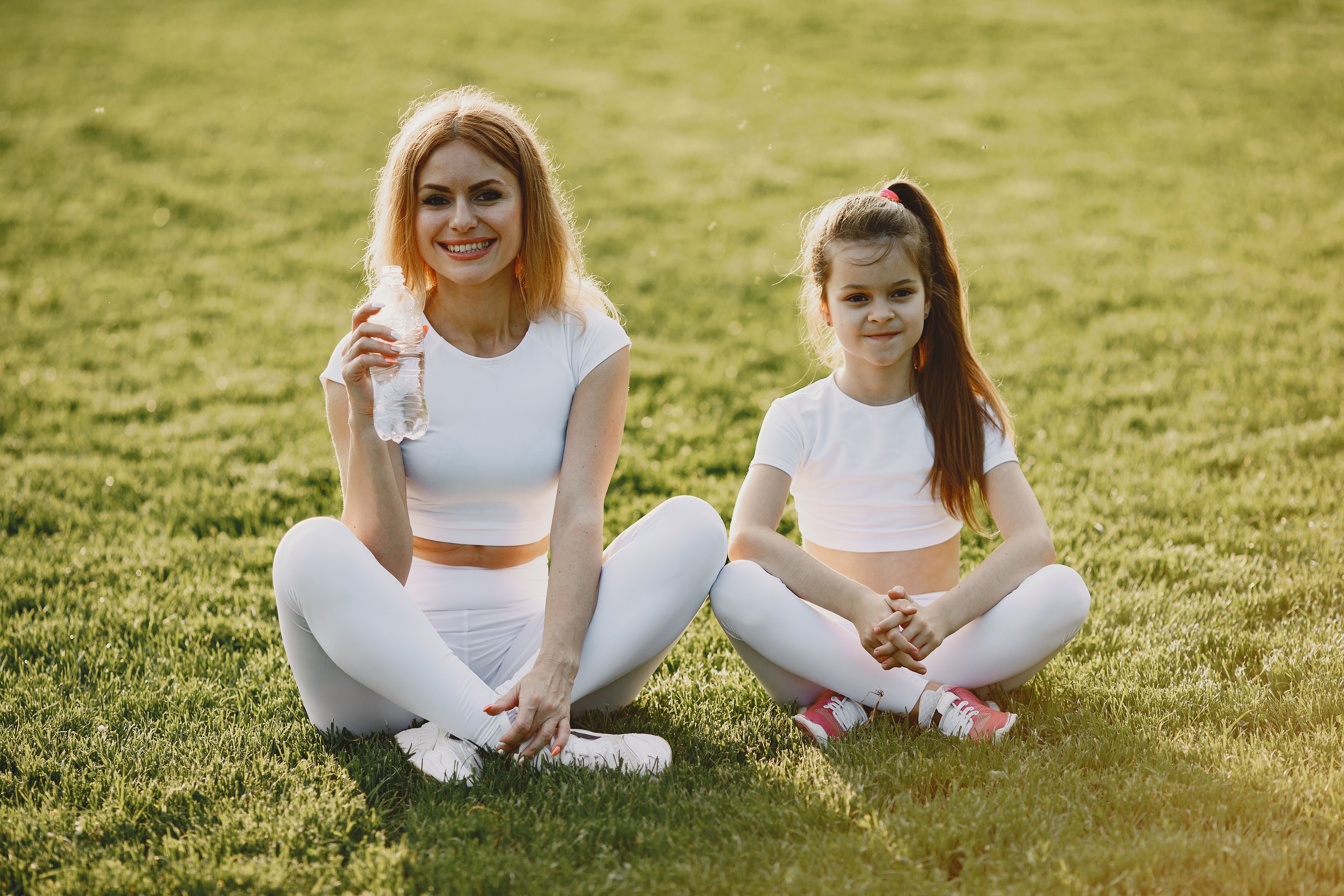 A Woman and a Girl in Matching Activewear Outfits · Free Stock Photo