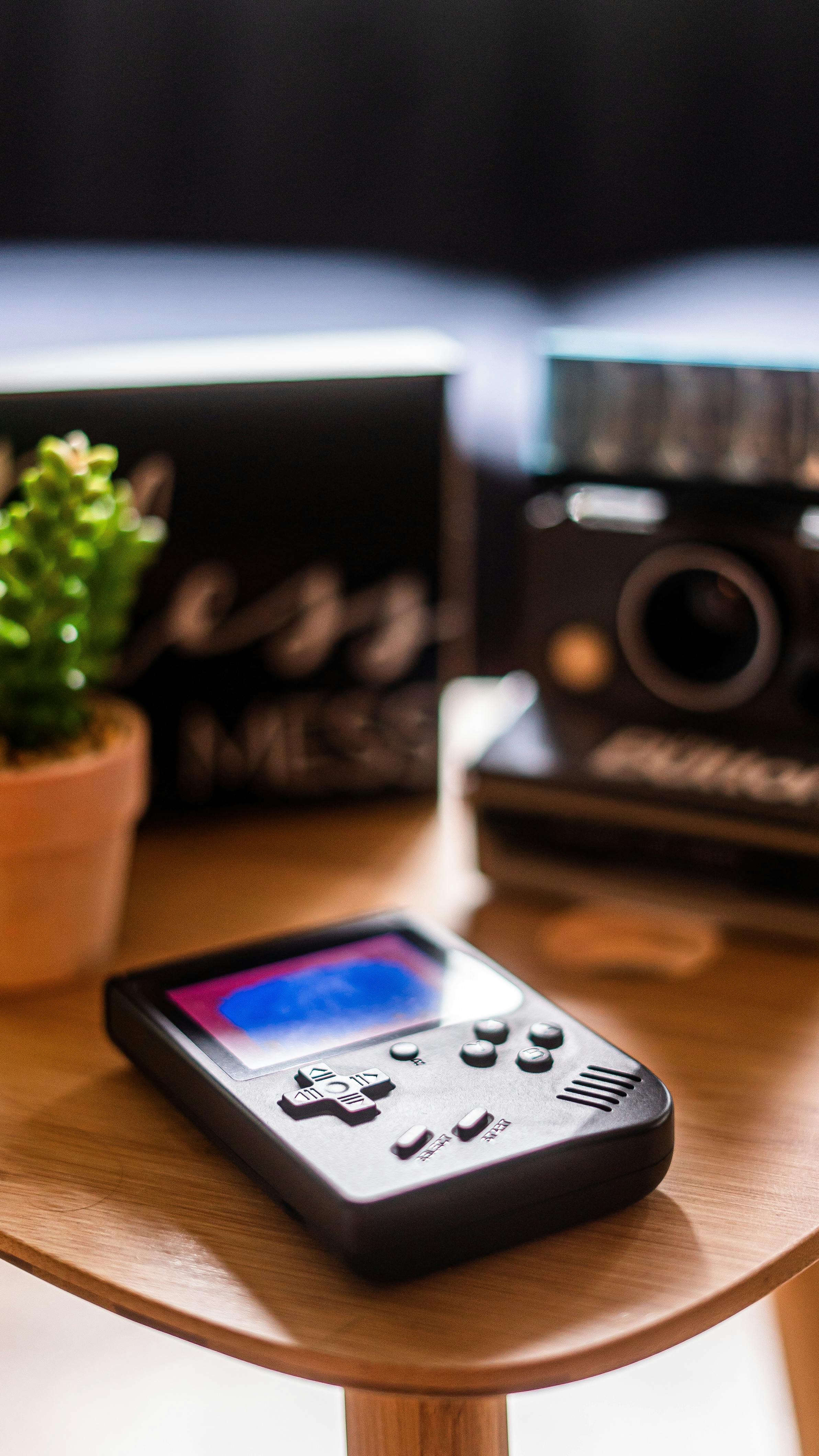 Portable game console on table · Free Stock Photo