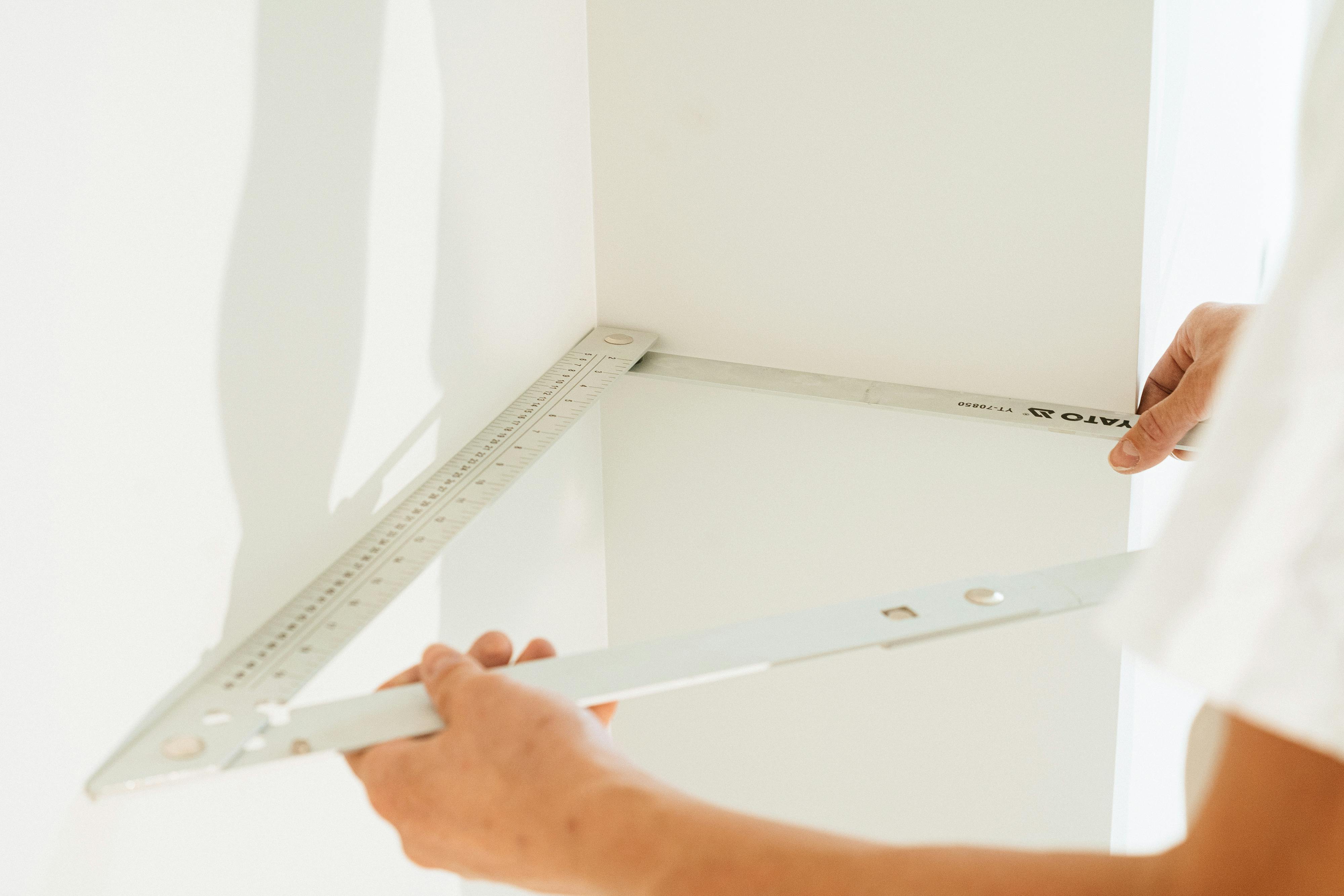 Hands Holding Measurement Tool · Free Stock Photo