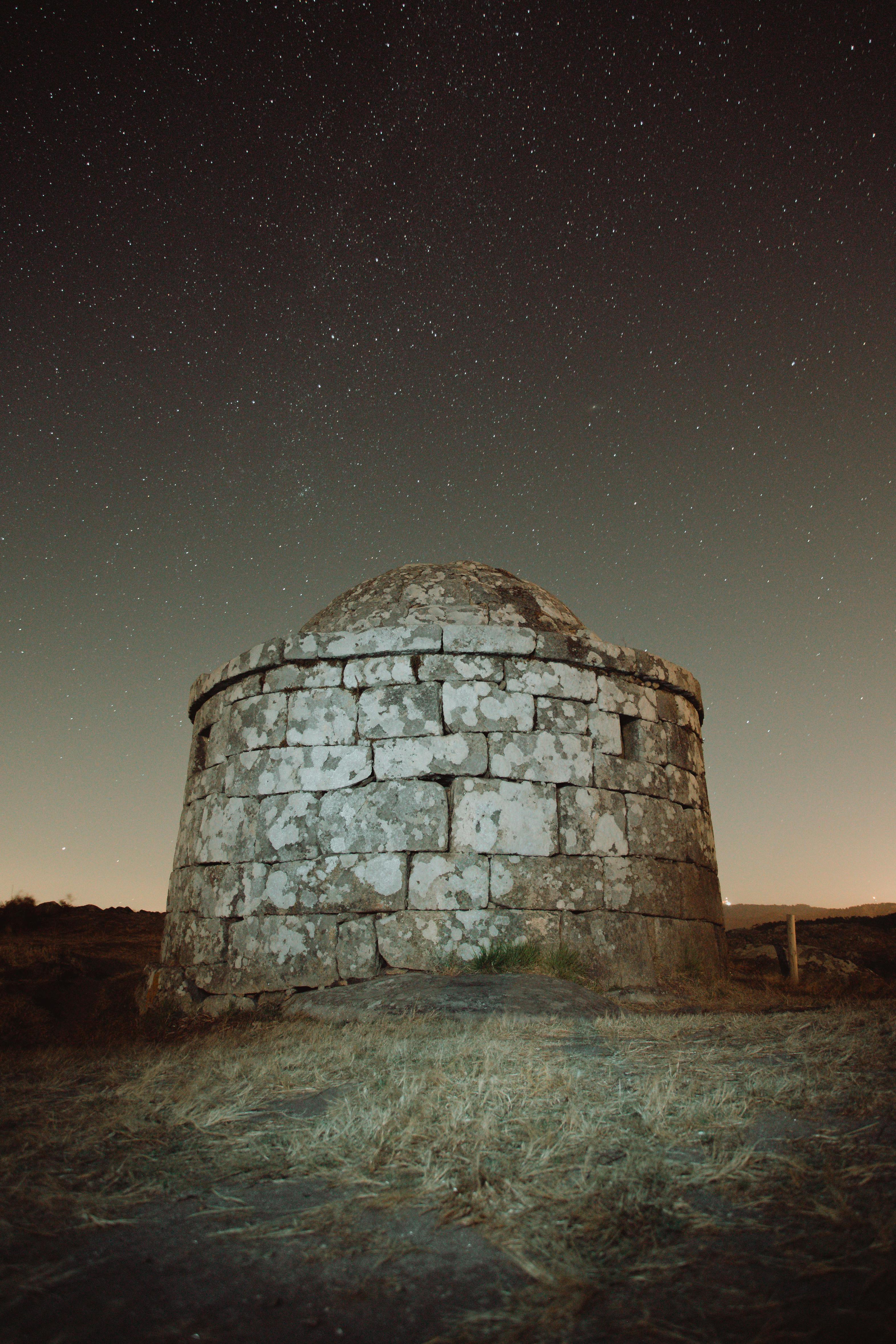 Old lighthouse with stone ruins · Free Stock Photo