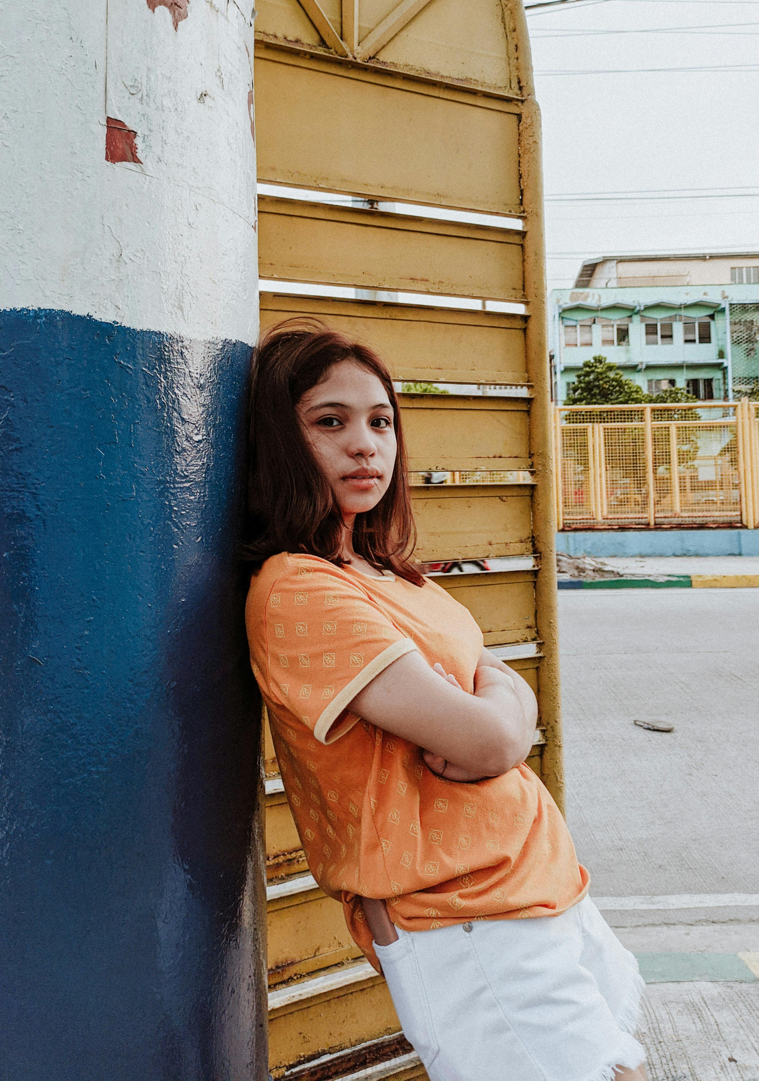 Women Standing With Arms Folded Side View