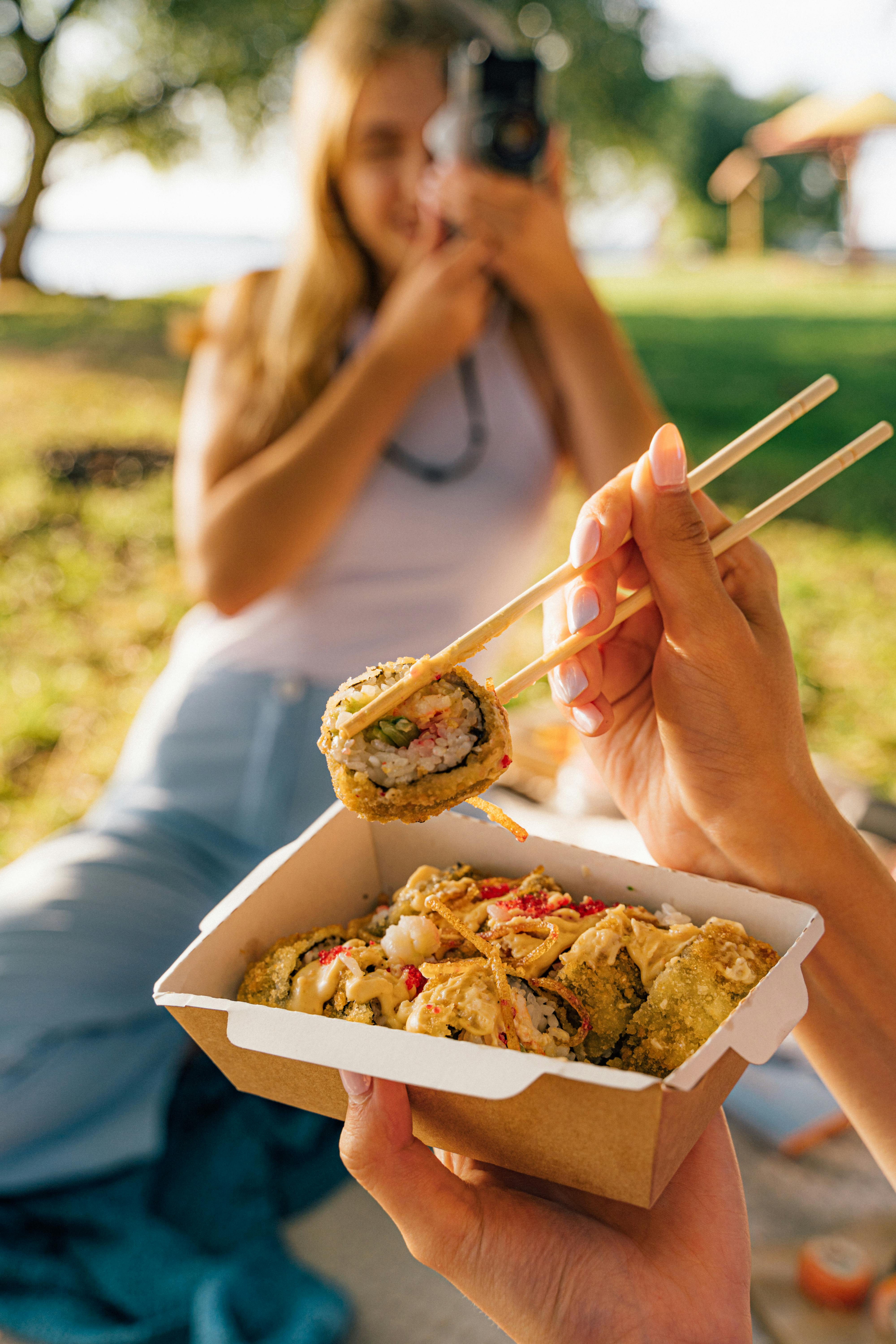 Person Holding Chopsticks · Free Stock Photo