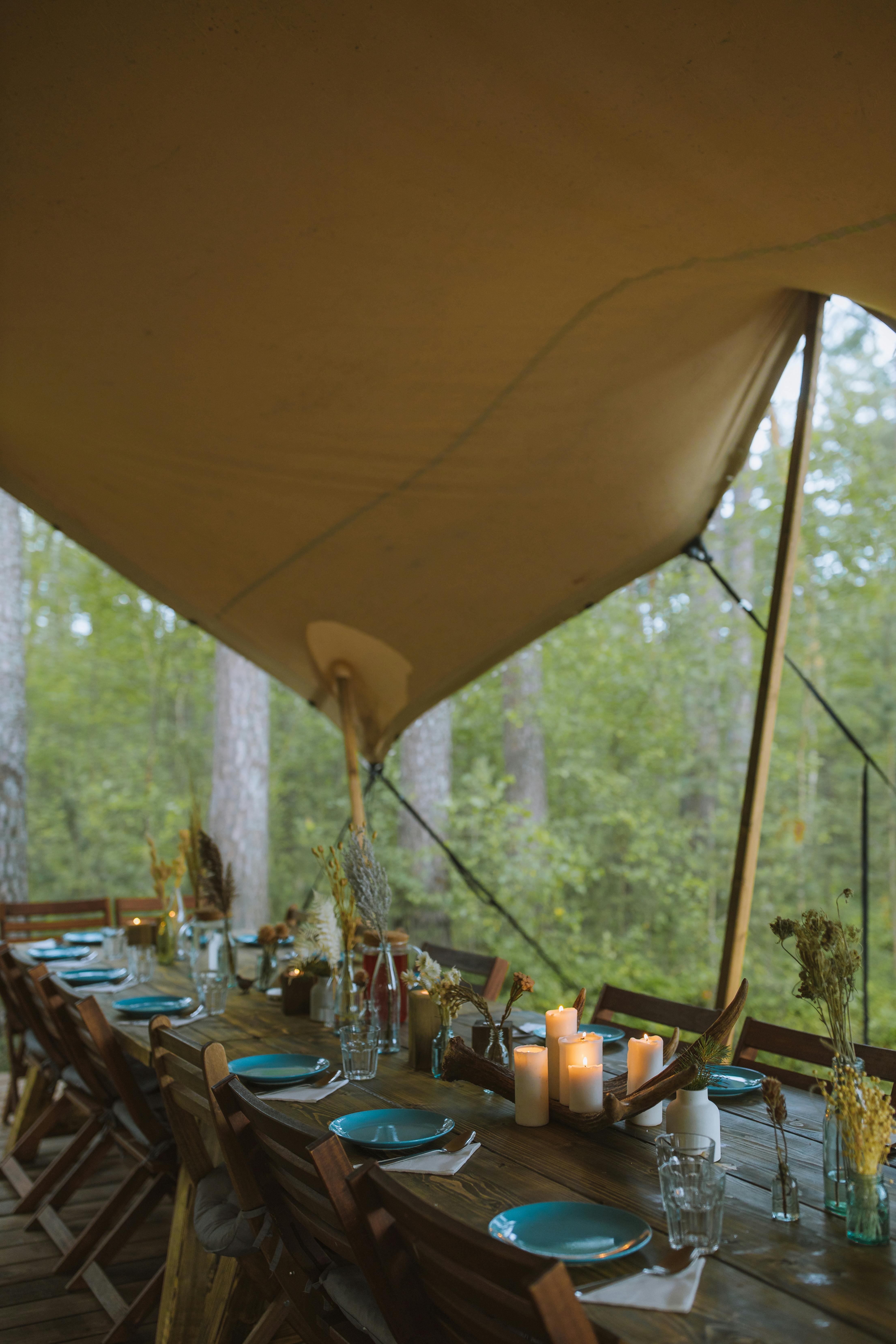 A Dining Table Under a Canopy · Free Stock Photo