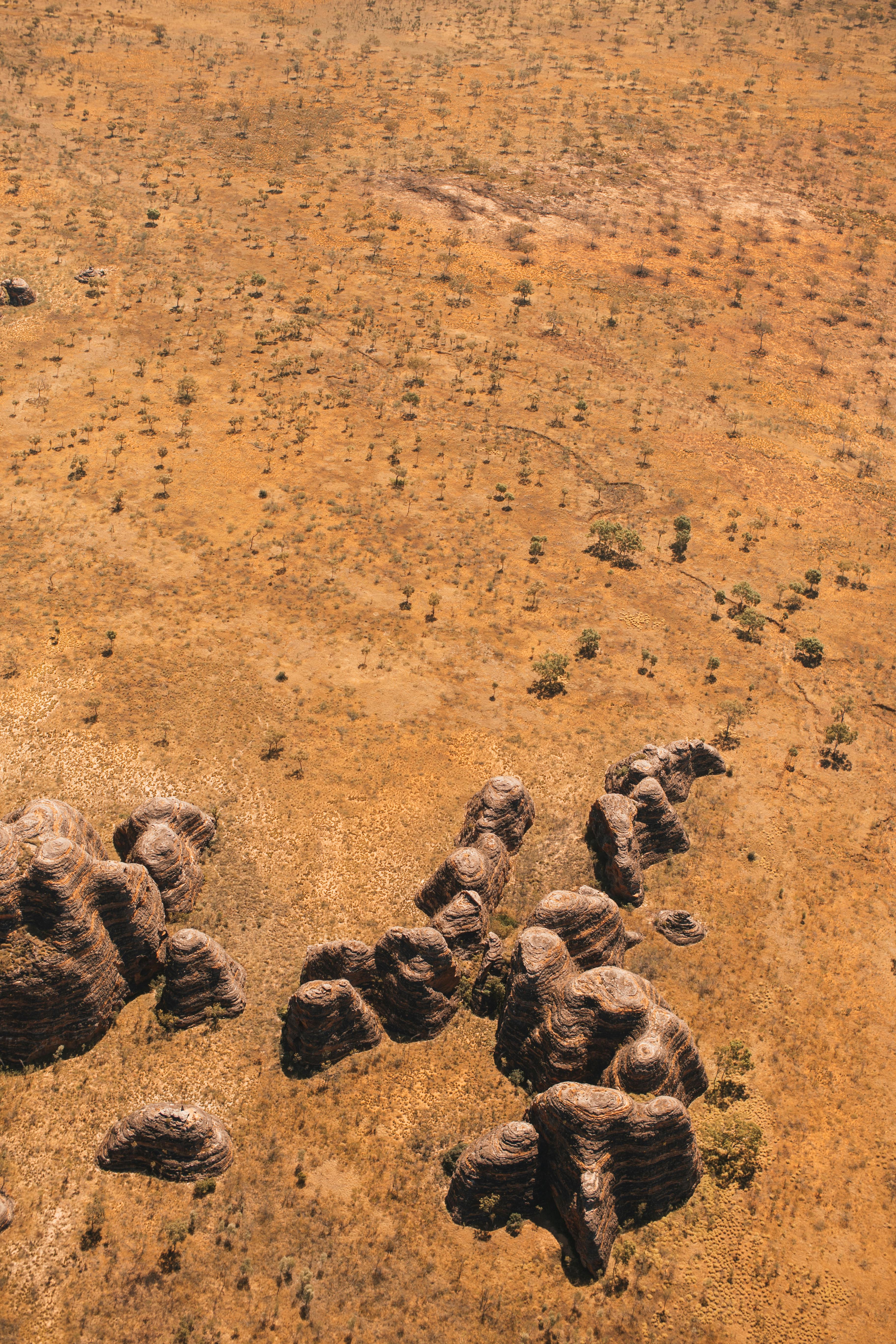 Rocky formations in desert terrain · Free Stock Photo