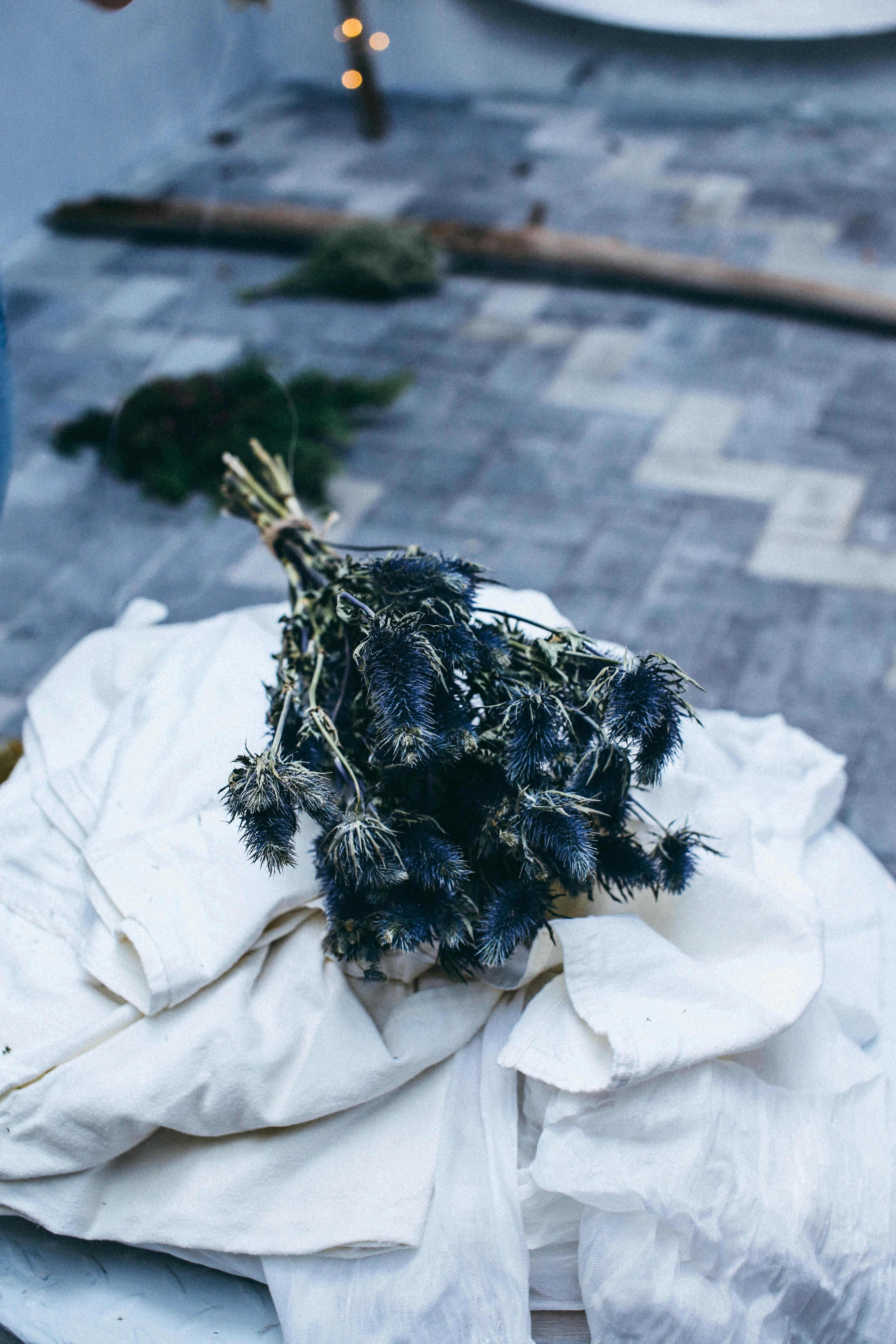 Bunch of dried linen hanging on wall · Free Stock Photo