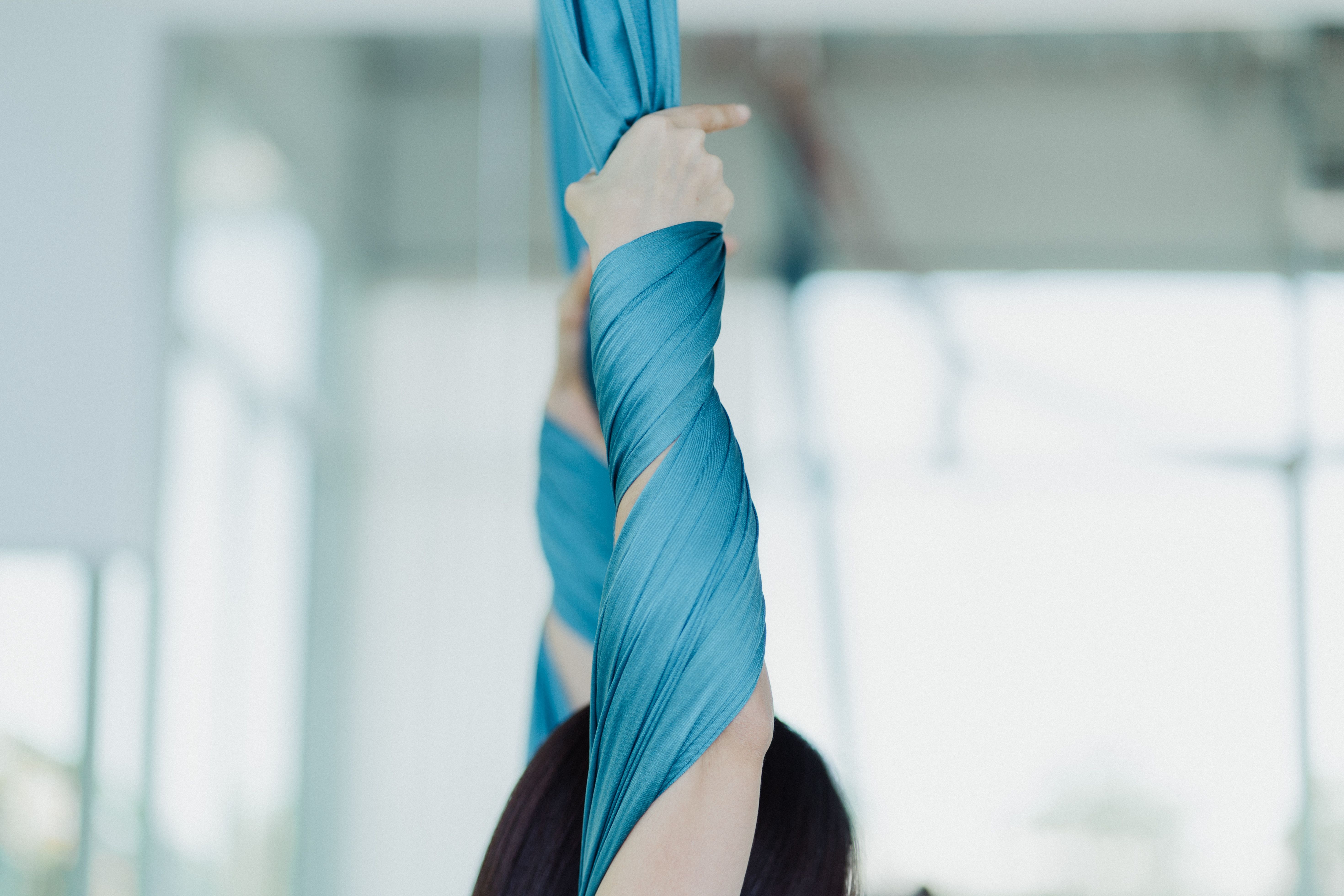 Close-Up Shot of a Person Holding an Aerial Silk · Free Stock Photo