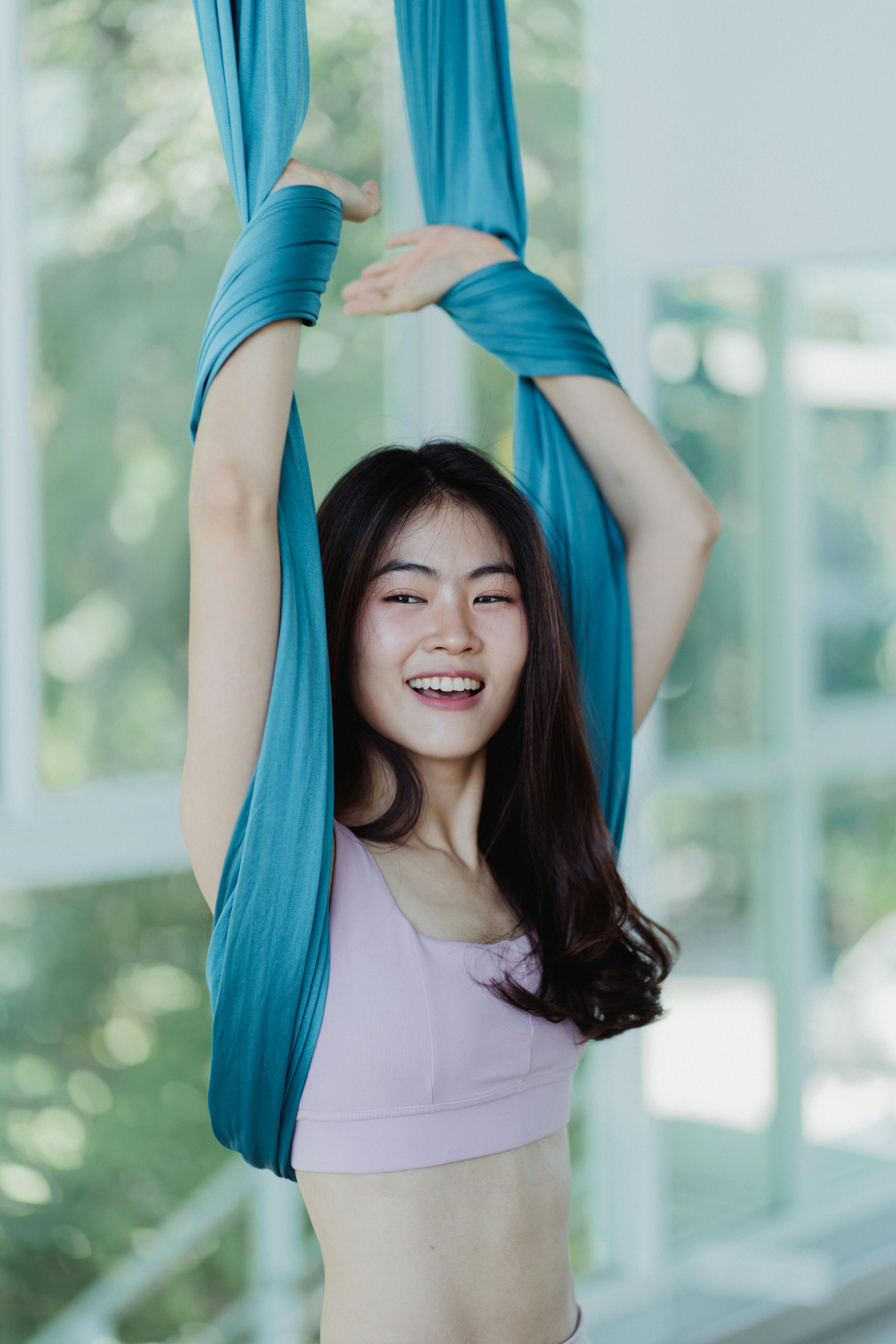 Portrait of Happy Woman with Gymnastic Sash · Free Stock Photo