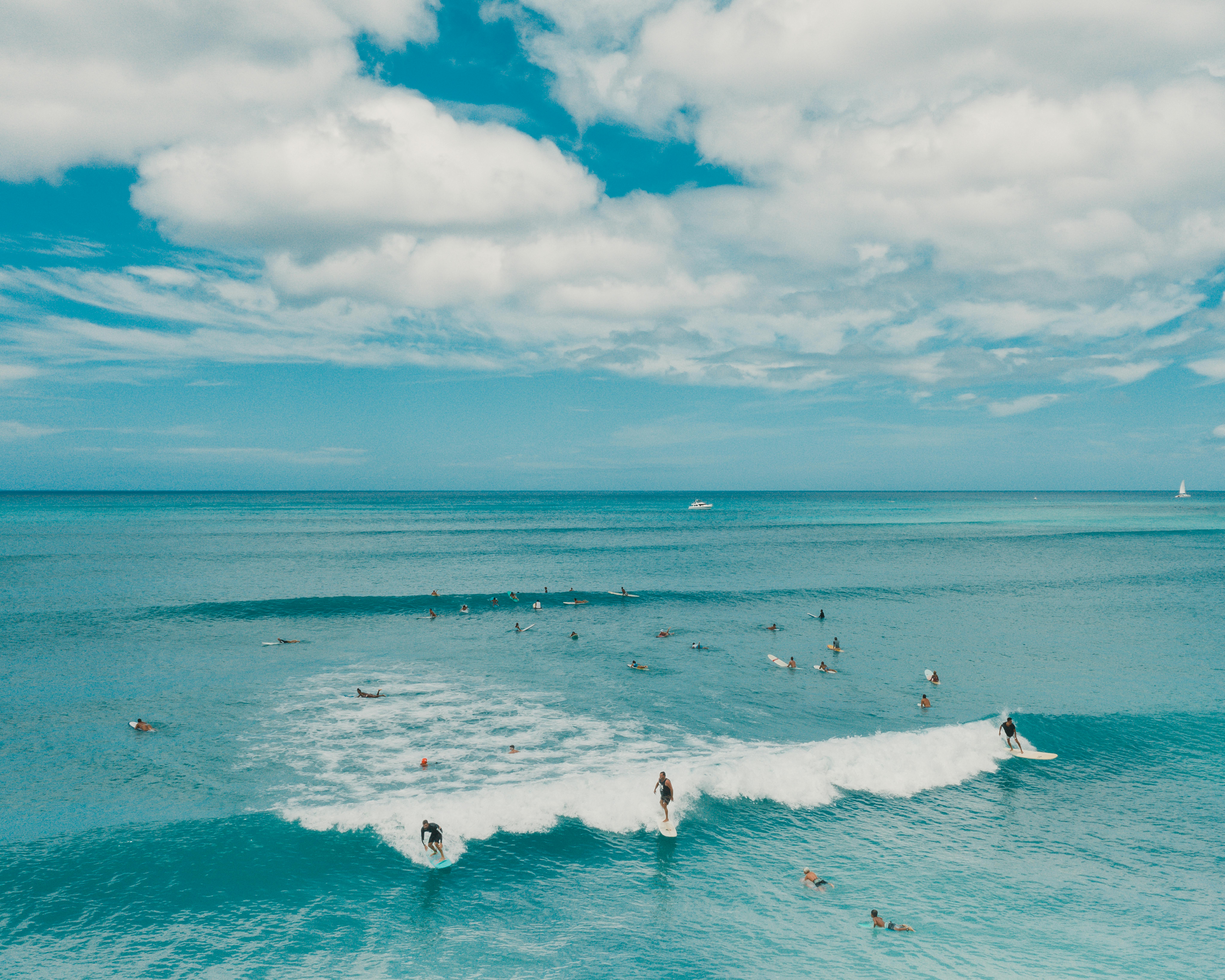 People Surfing in the Sea · Free Stock Photo