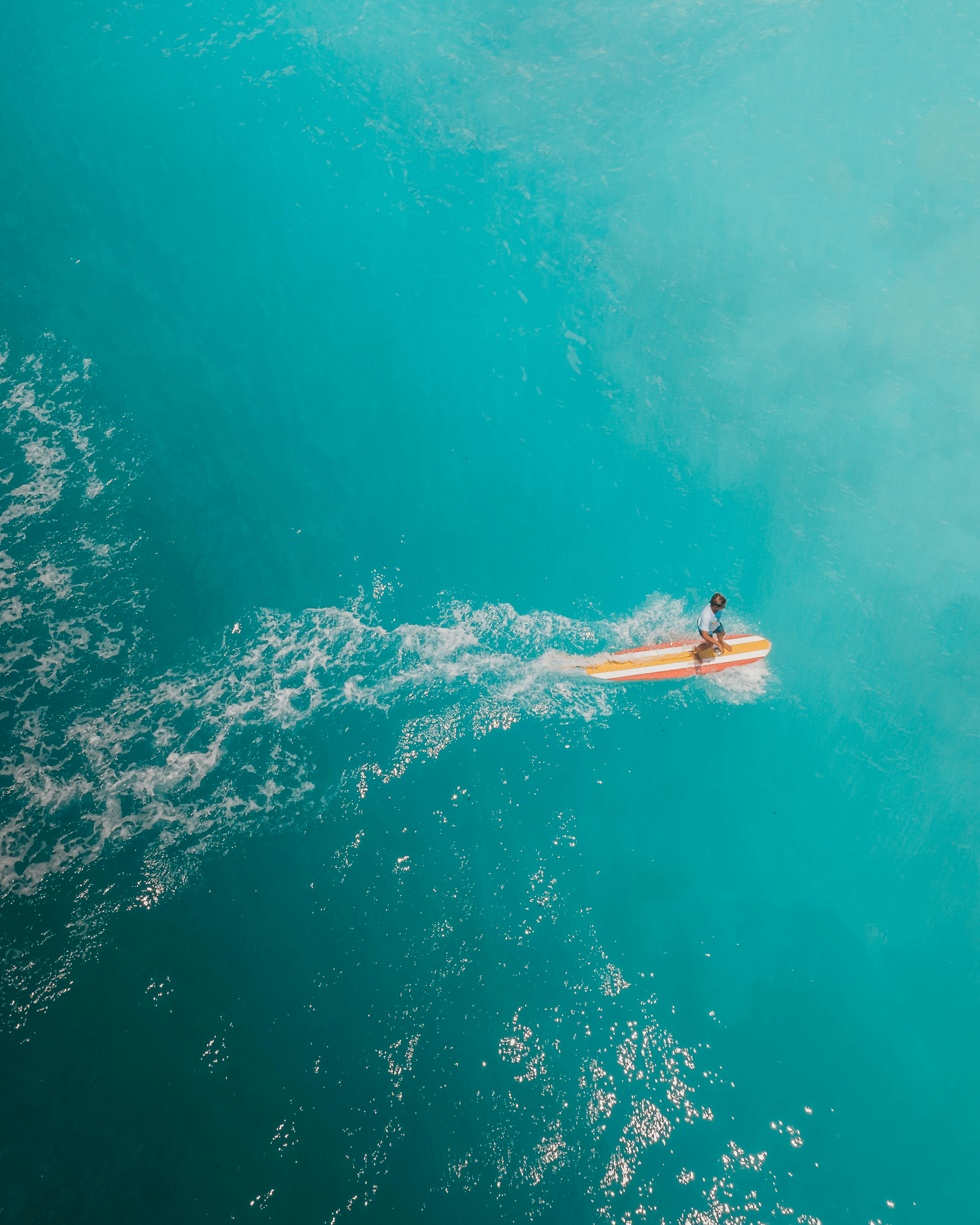 Top View of Man Surfing · Free Stock Photo