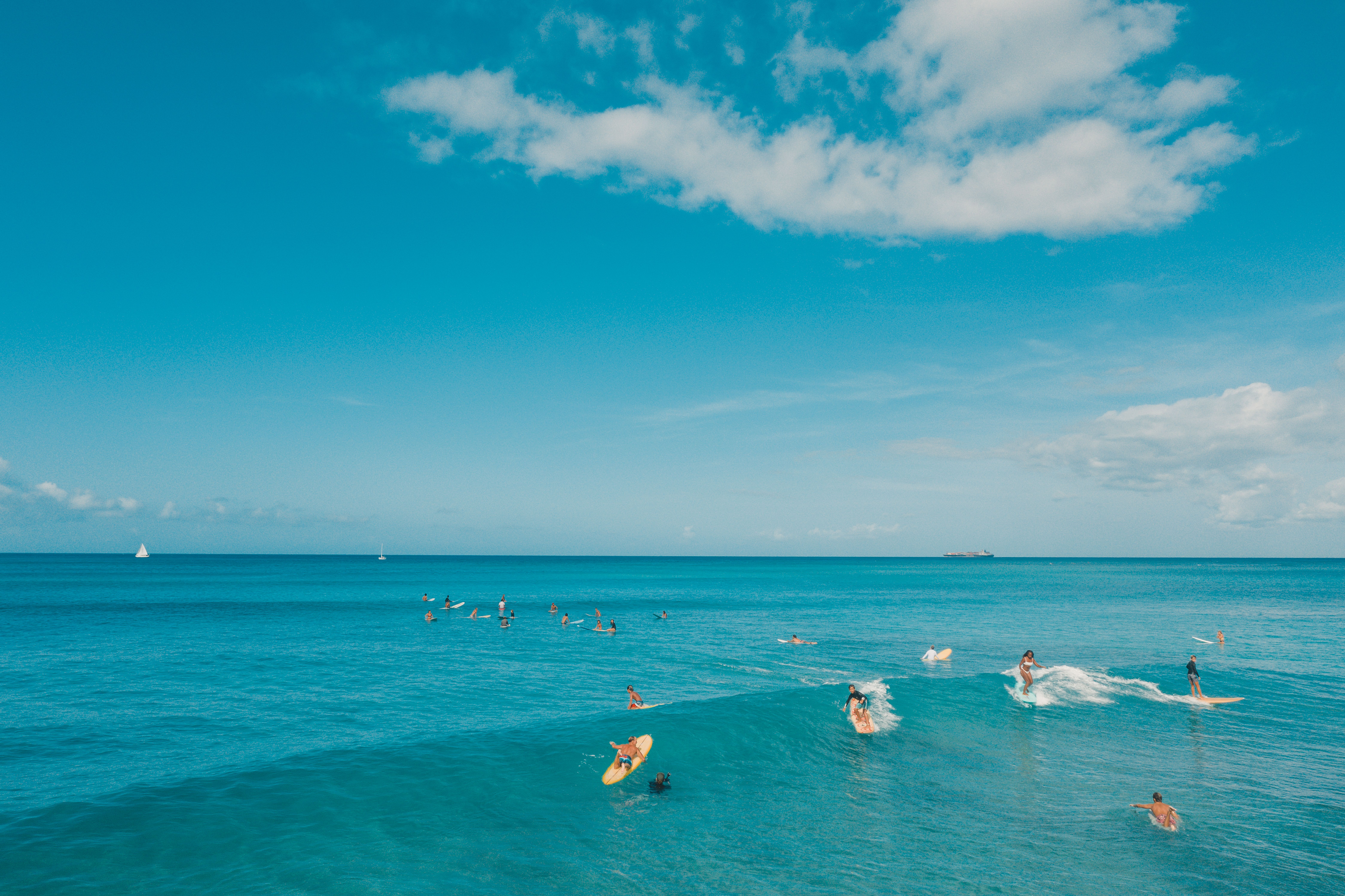 Surfing in Blue Sea · Free Stock Photo