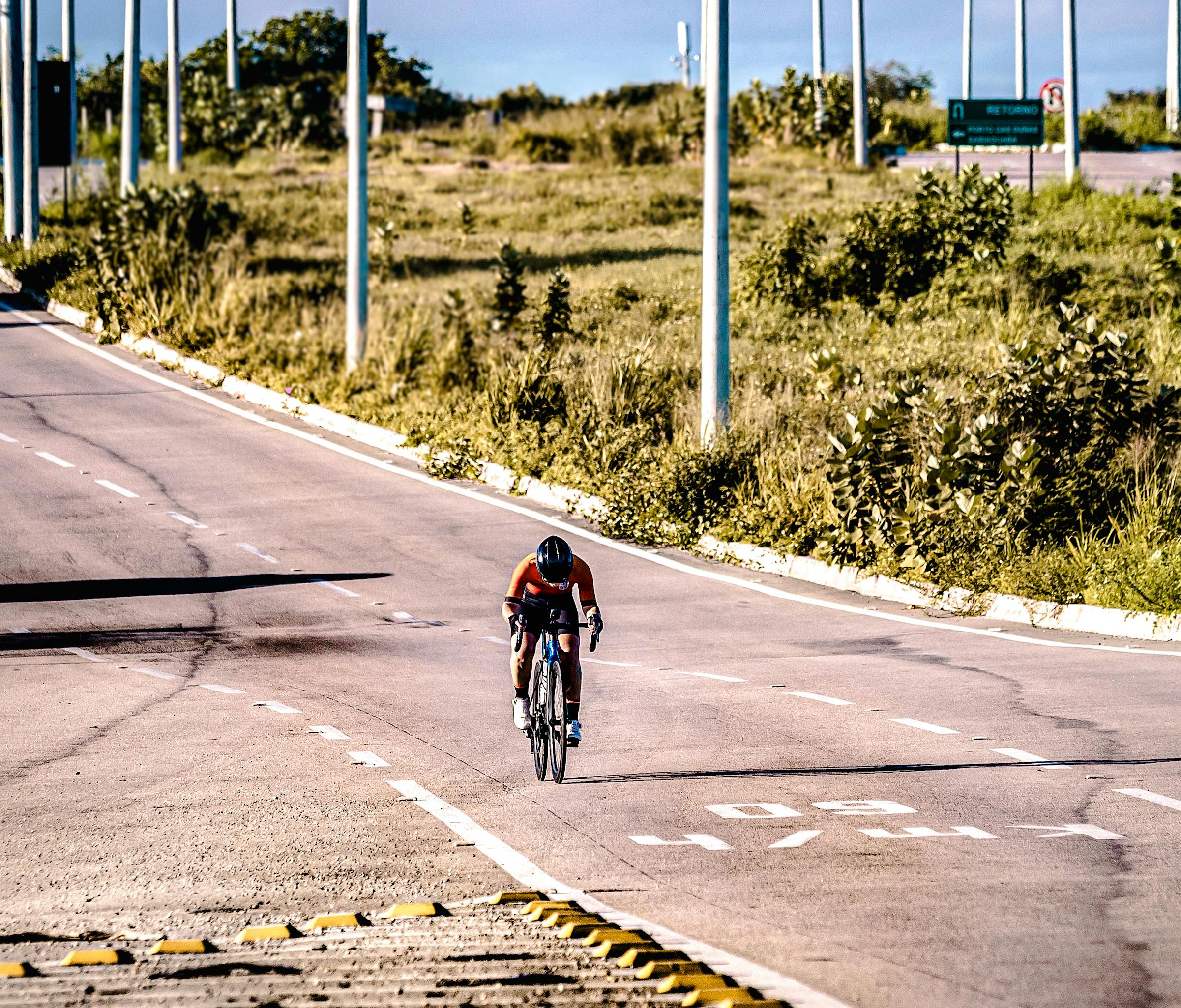 Man Riding Bicycle on Road · Free Stock Photo