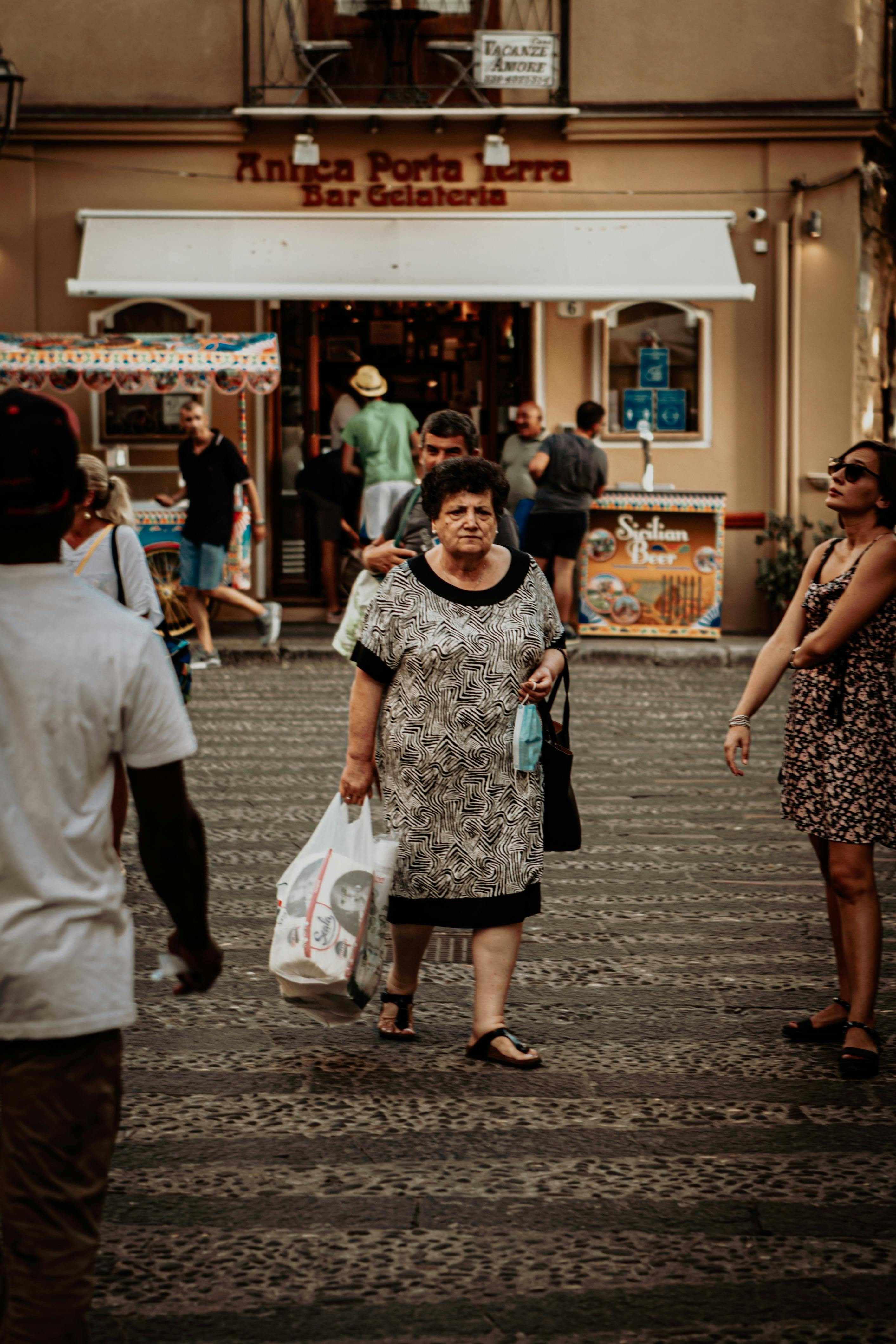 People walking on city street in daytime · Free Stock Photo
