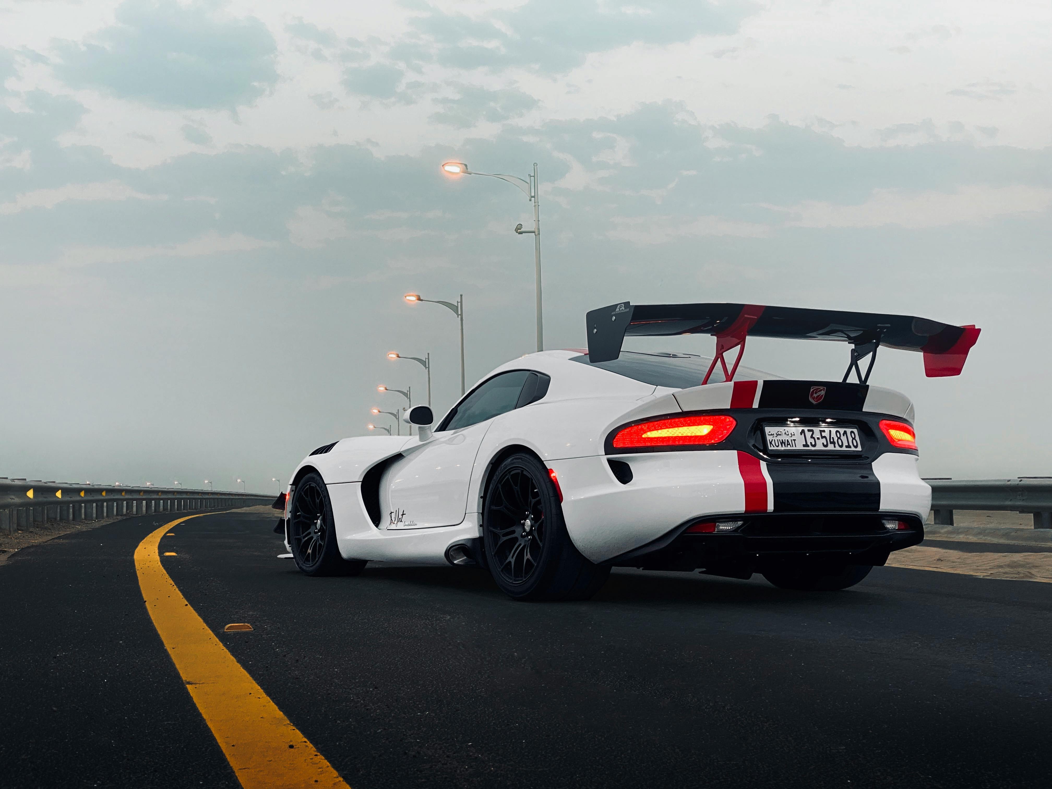 White Sports Car on the Road · Free Stock Photo