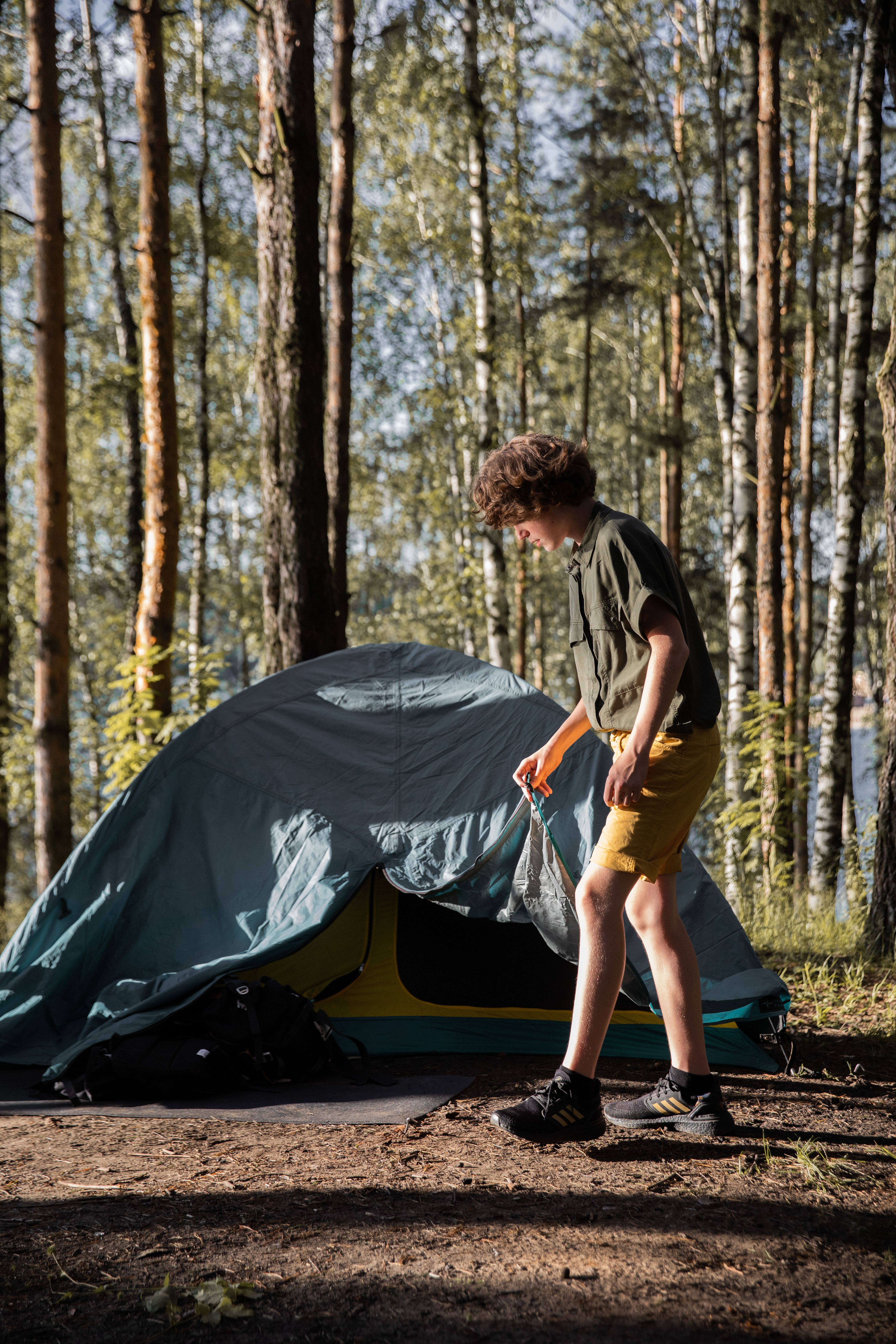 Boy Scout in front of a Tent · Free Stock Photo