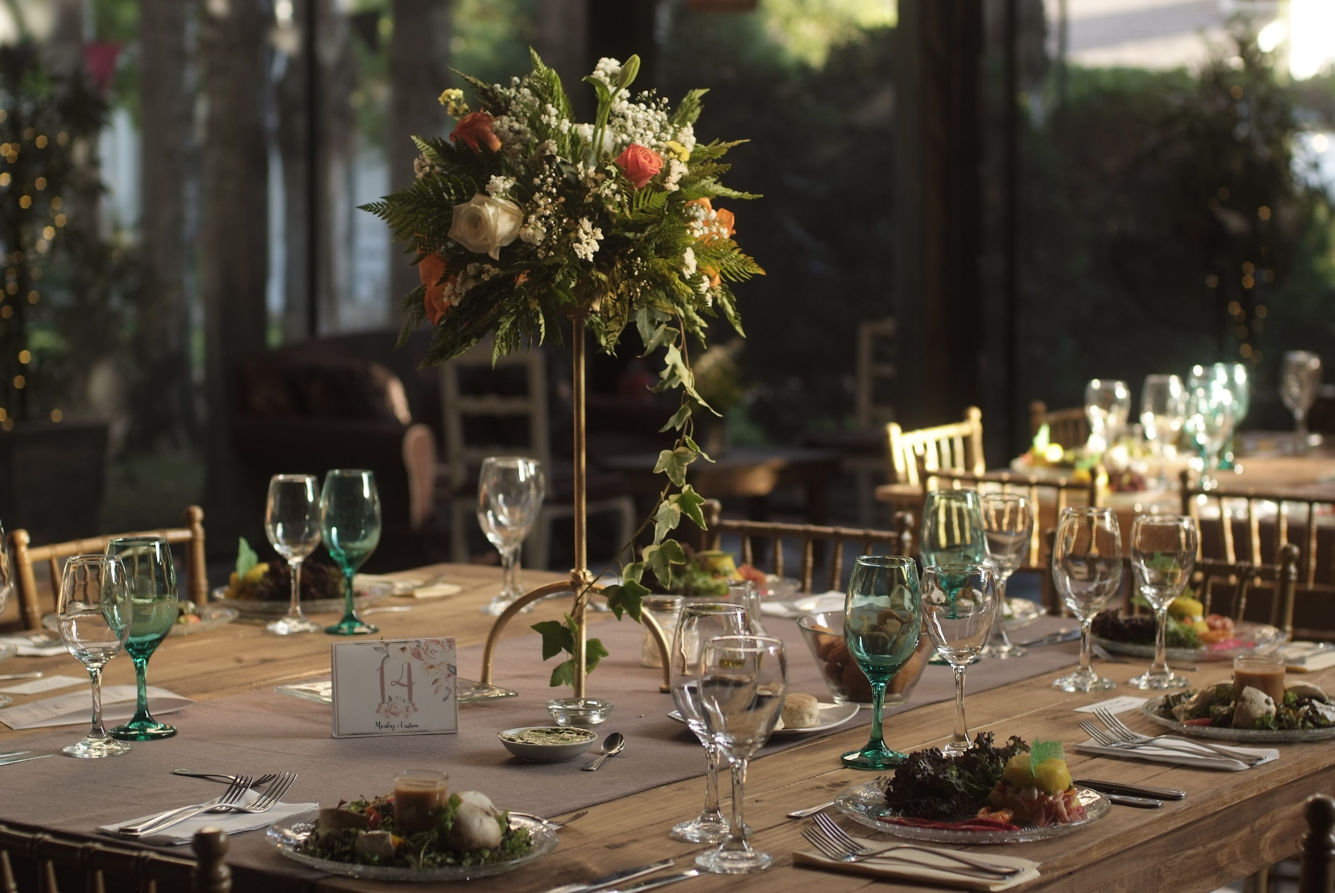Candles and Flower Arrangements on Table · Free Stock Photo