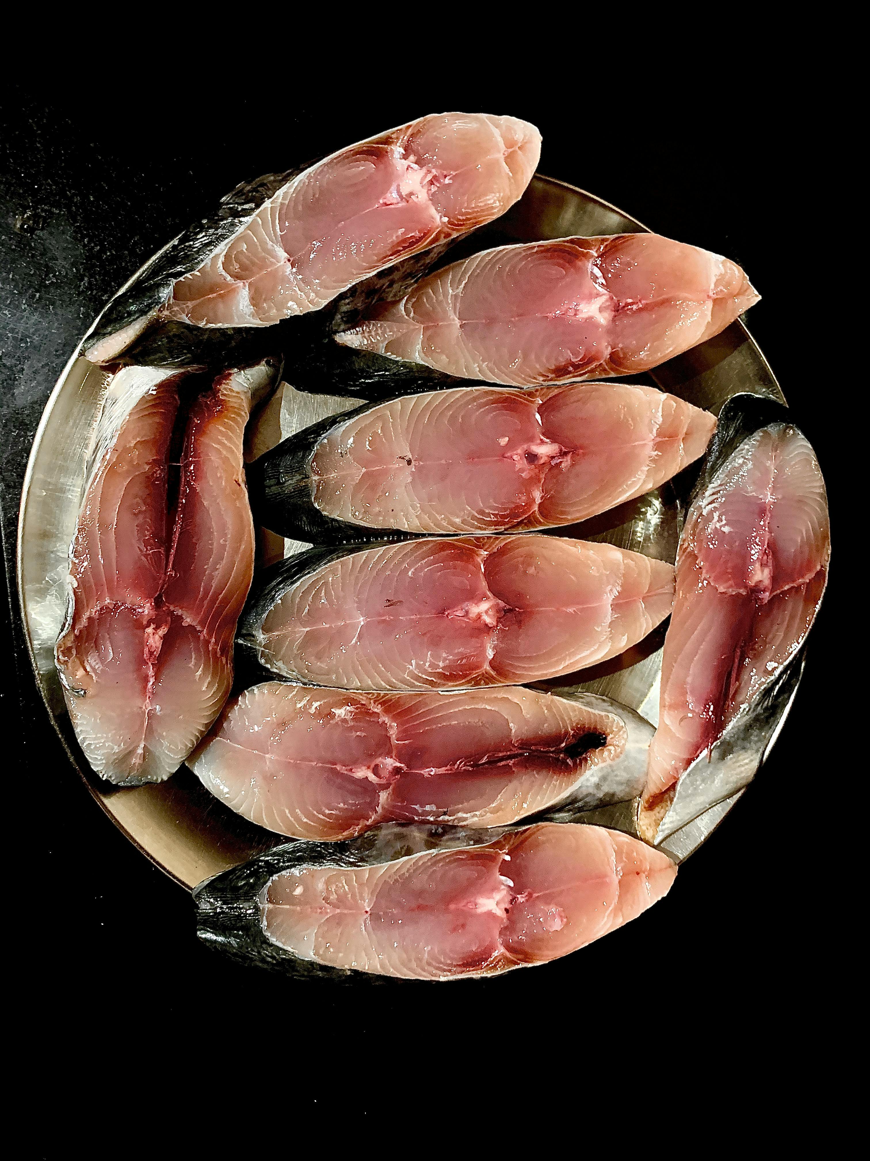 A Raw Sliced Fishes on a Stainless Plate · Free Stock Photo