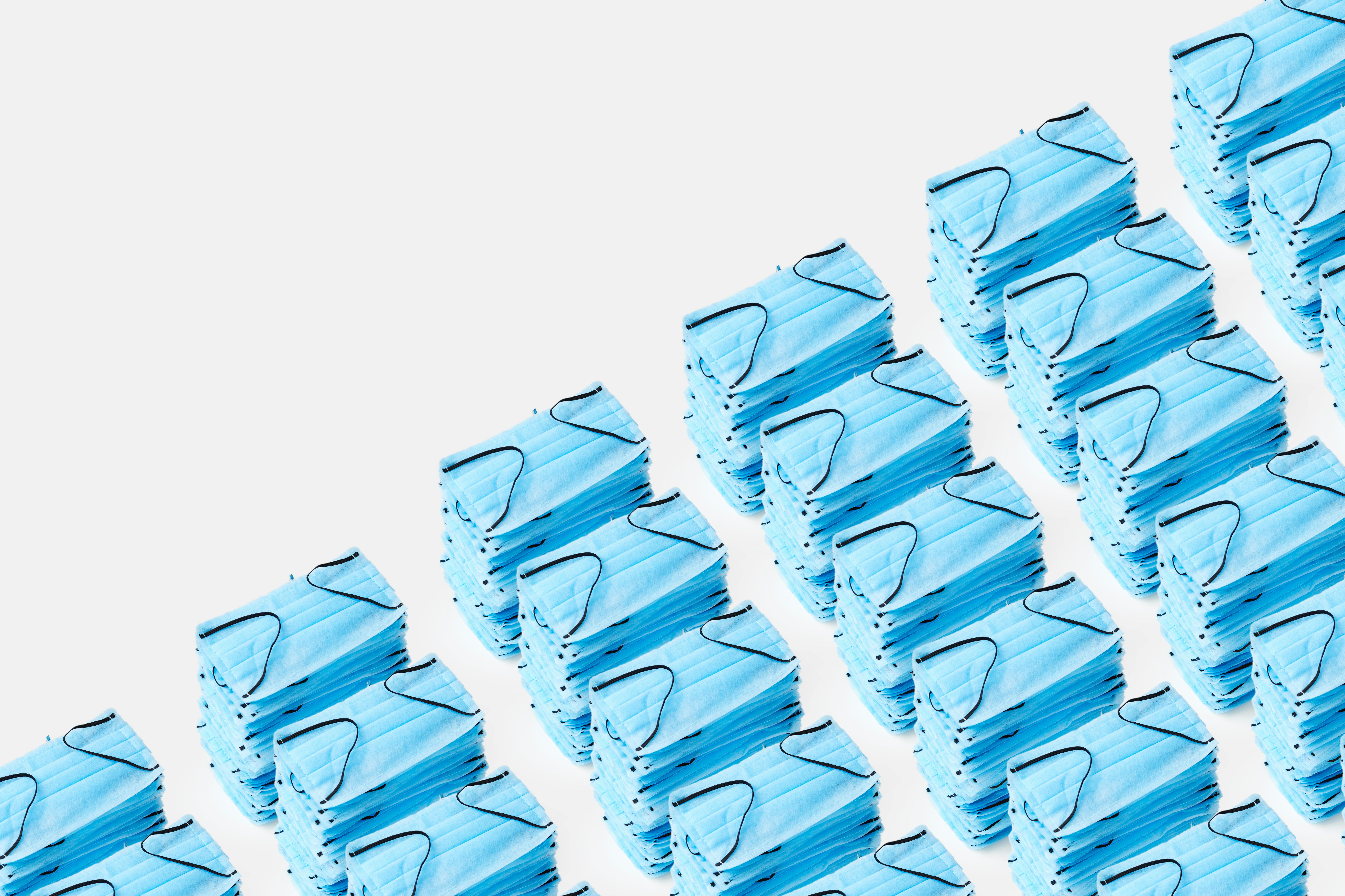 Stacks of Blue Face Masks · Free Stock Photo