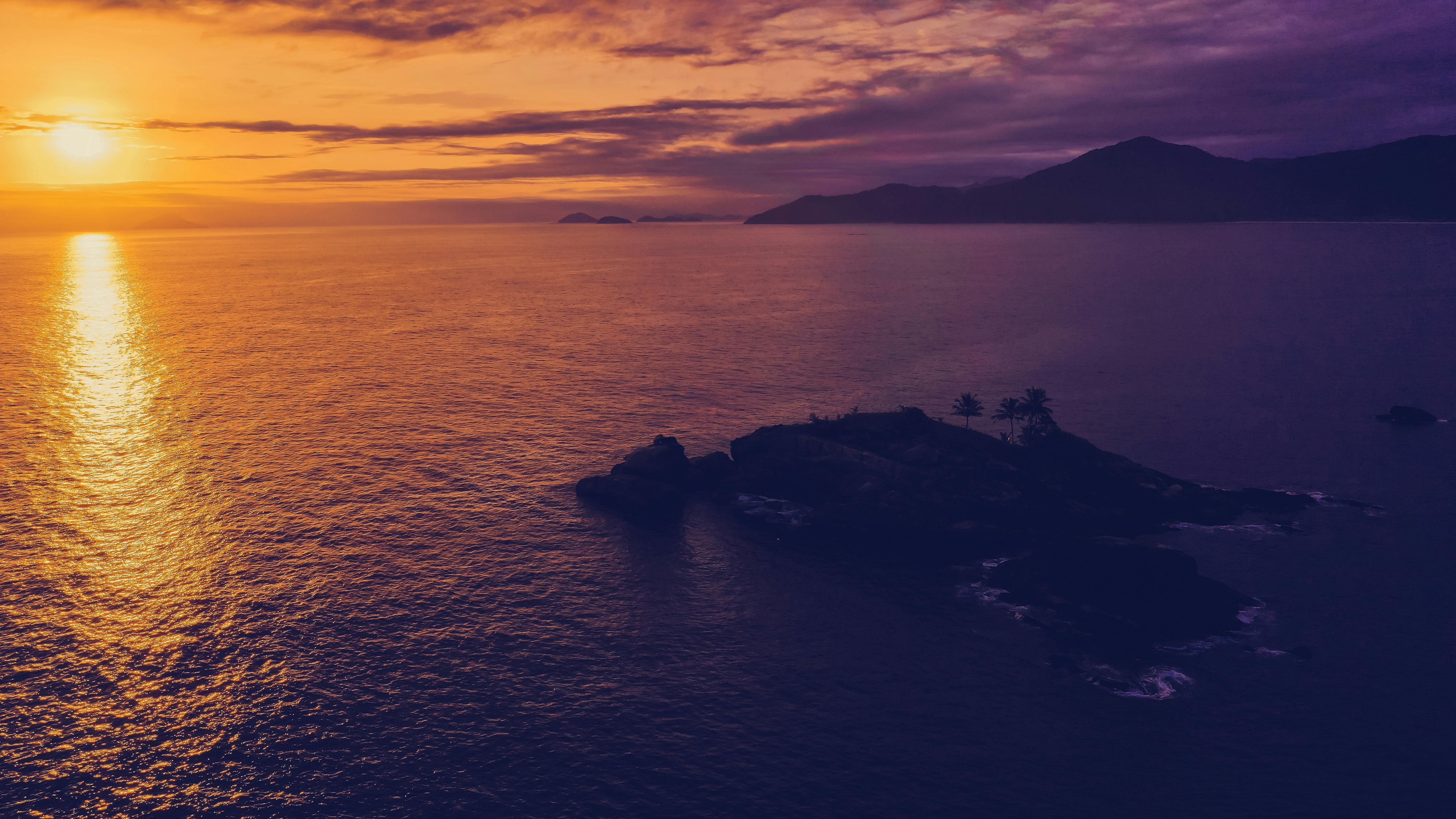 Rock Formation on Sea during Dawn · Free Stock Photo