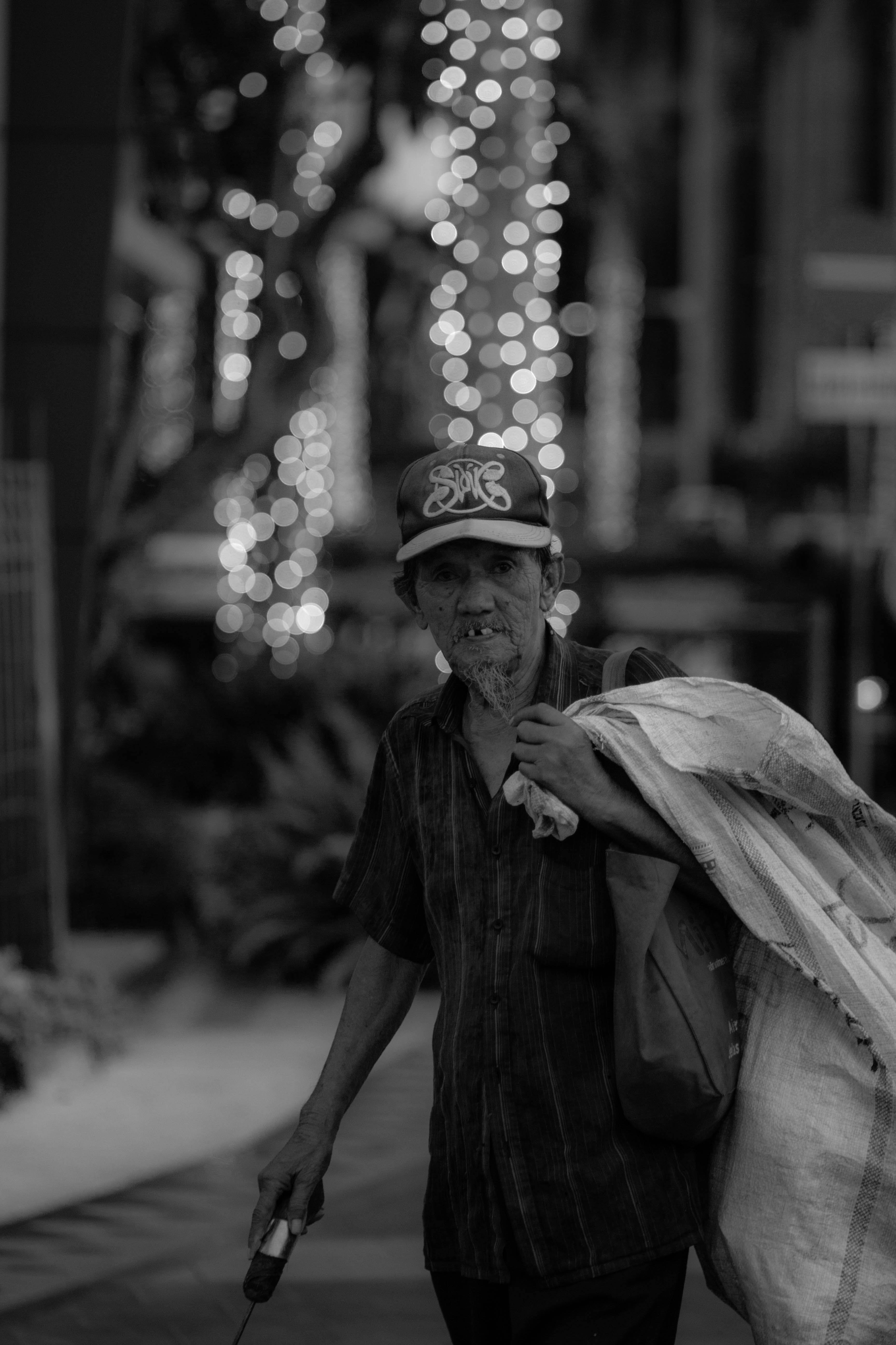 Man Walking Poor City Street · Free Stock Photo