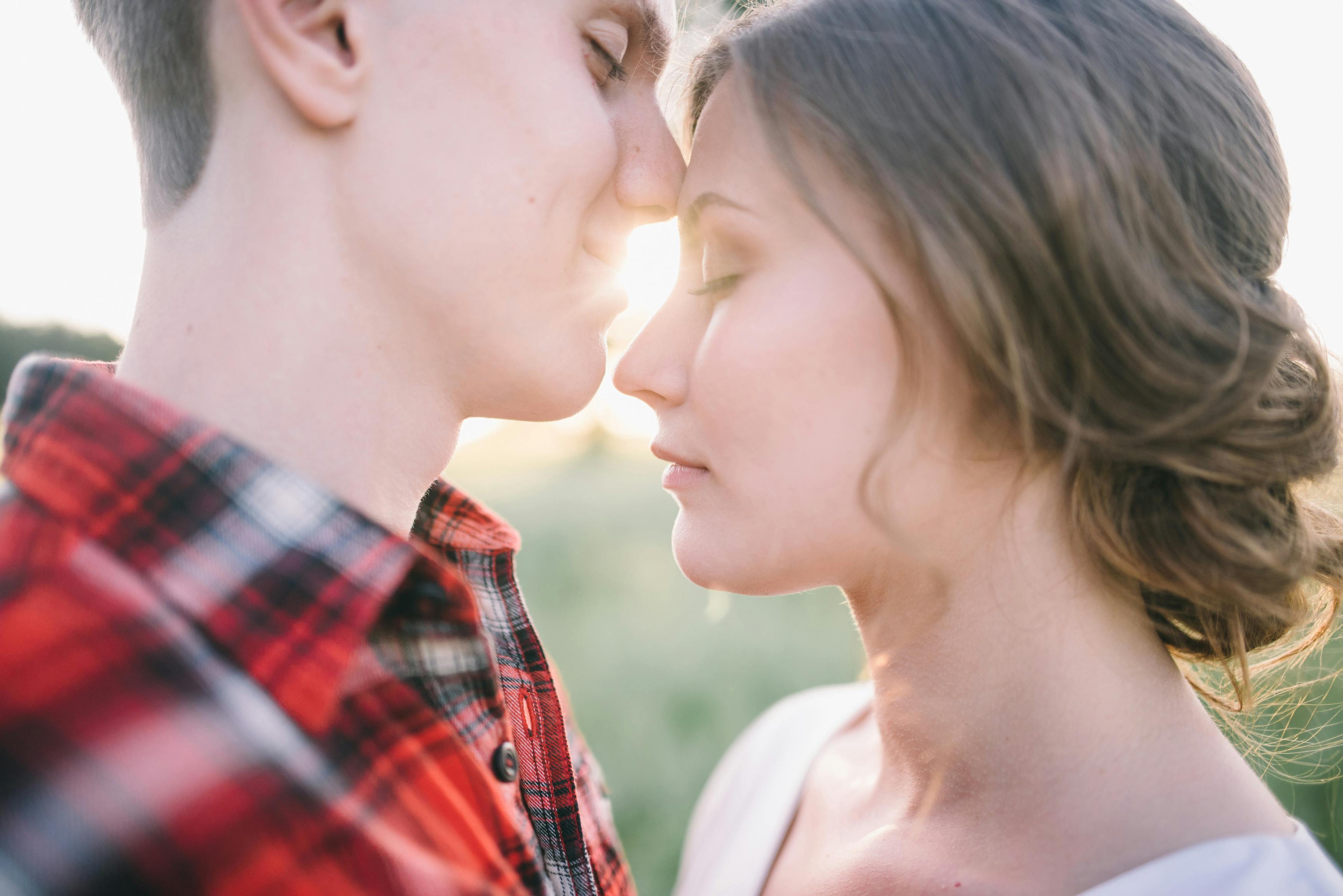Close Up Photo of Man Kissing the Hands of a Woman · Free Stock Photo