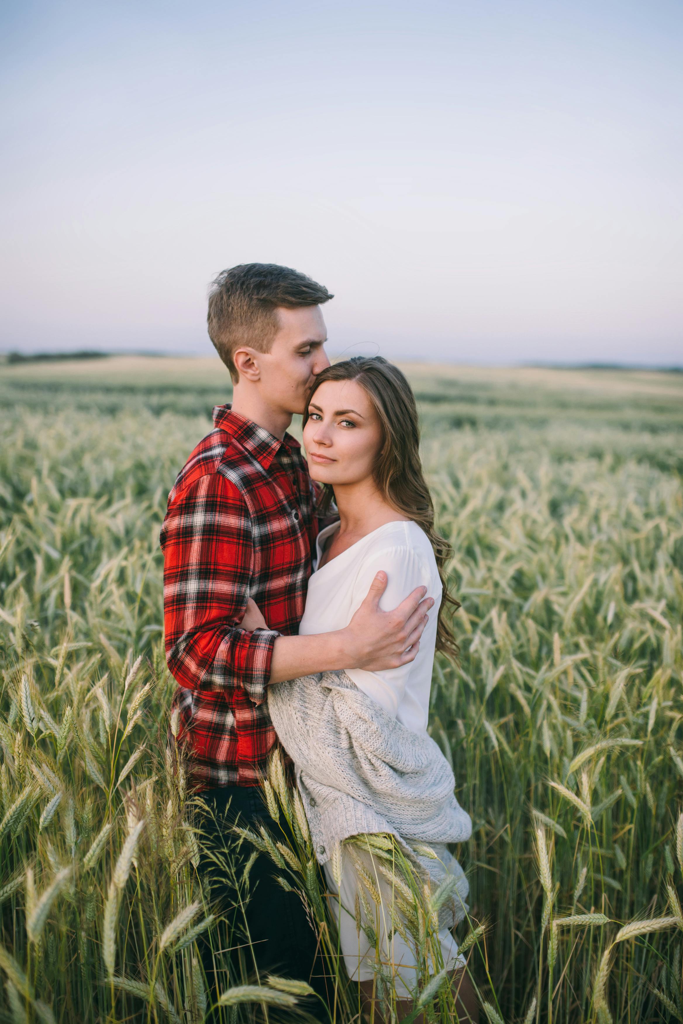 Three Women Standing Together Under Blue Sky · Free Stock Photo