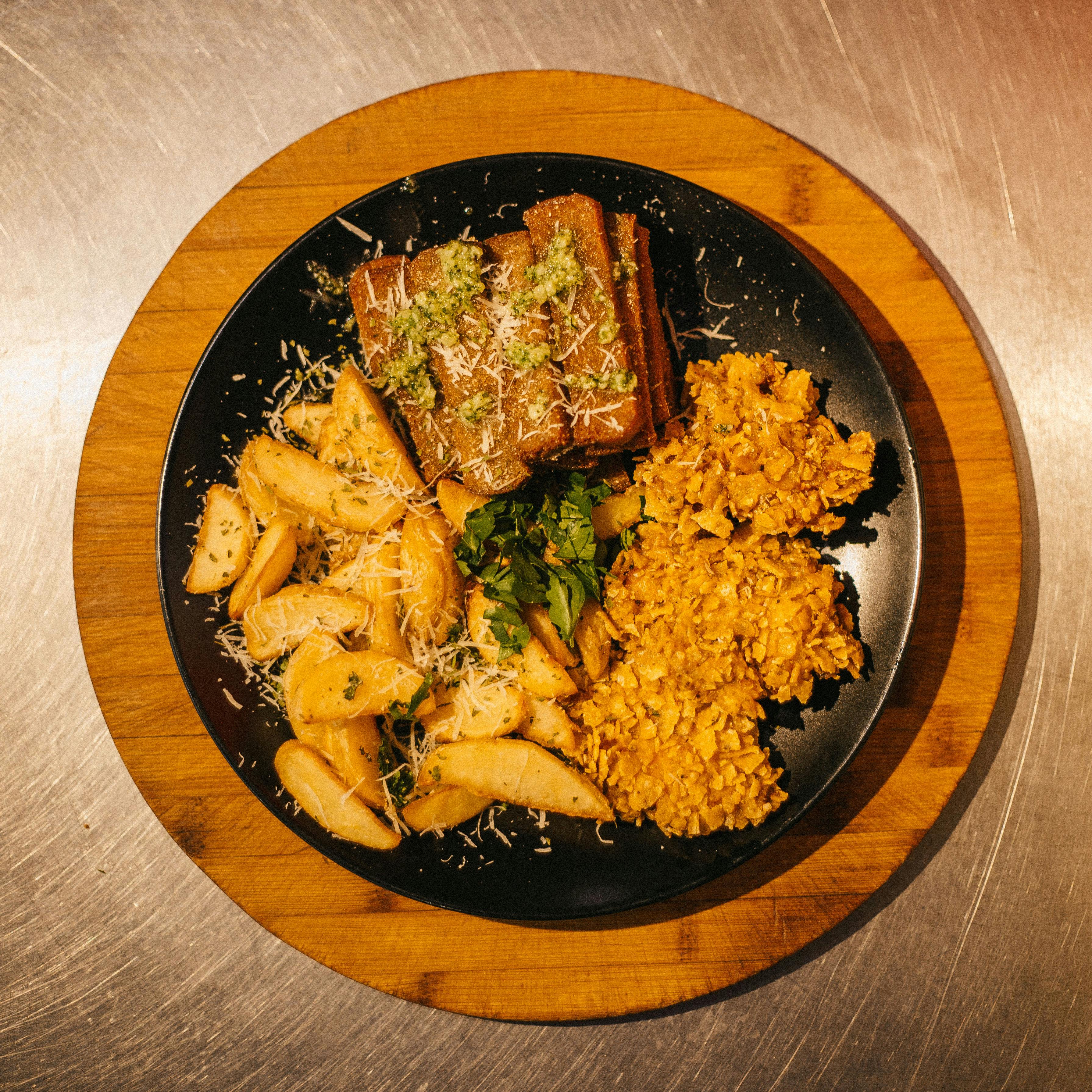 Food on Black Plate · Free Stock Photo