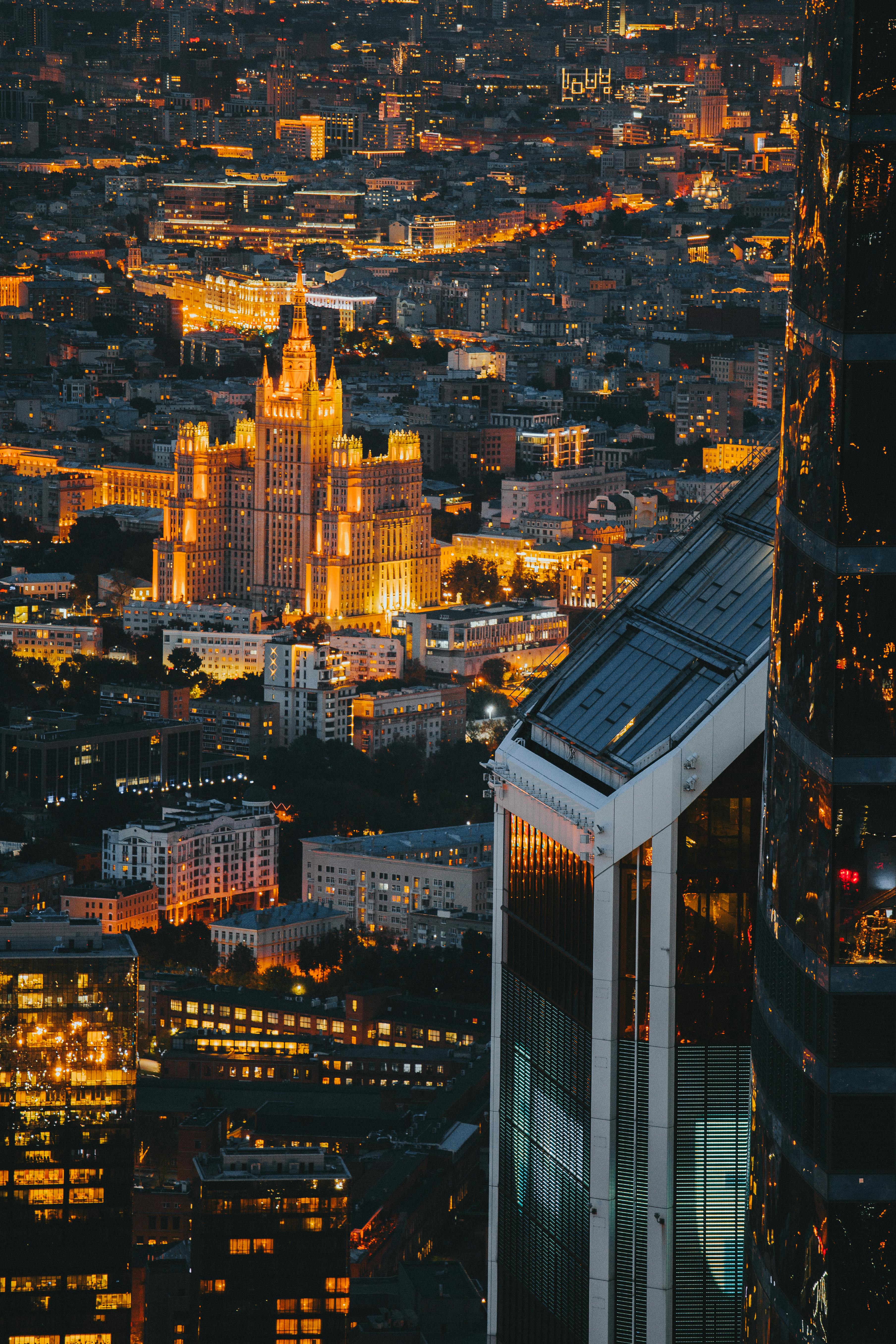 A Yellow Building with Brown Chimney During Night Time · Free Stock Photo