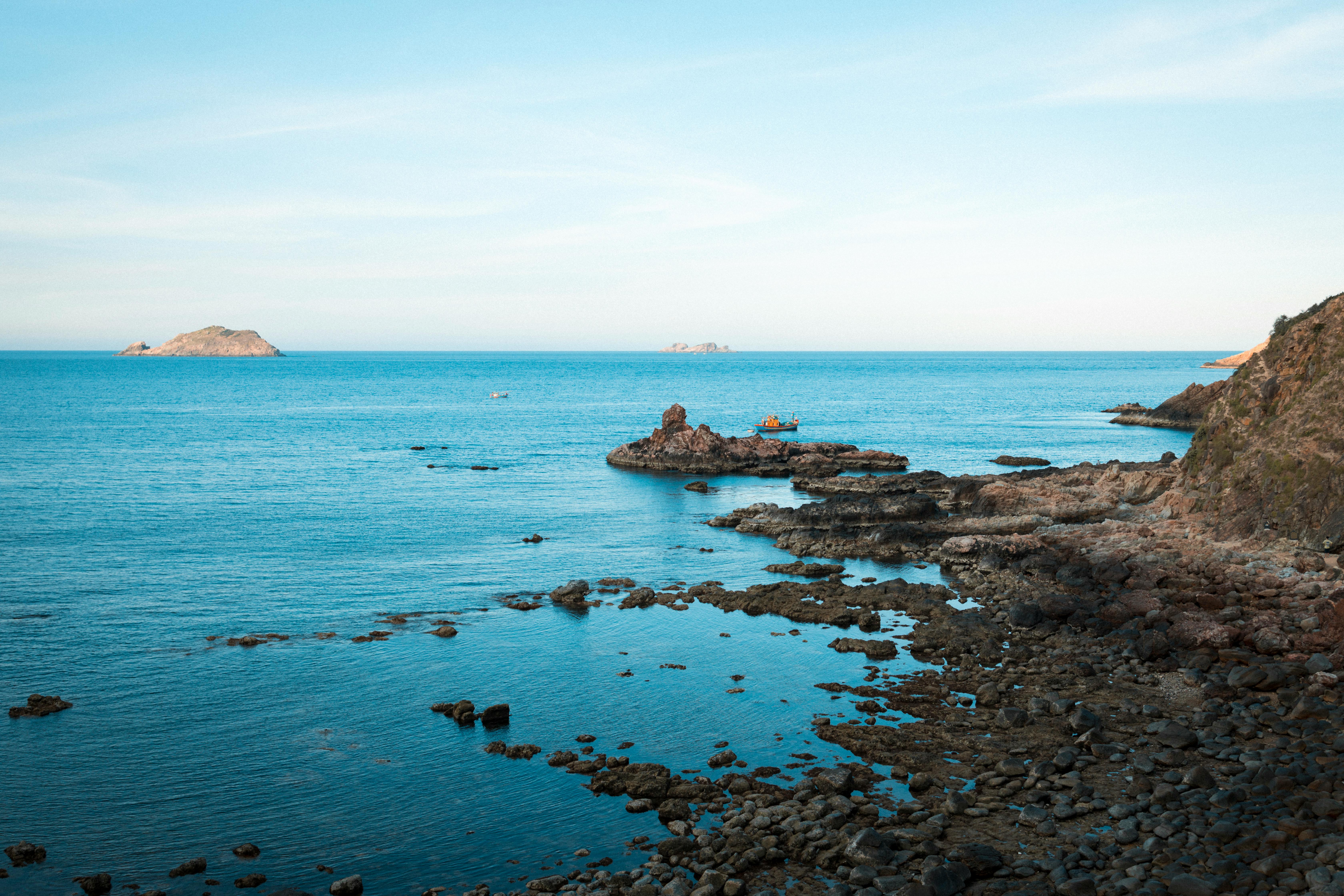 Wavy Ocean Under Blue Sky · Free Stock Photo