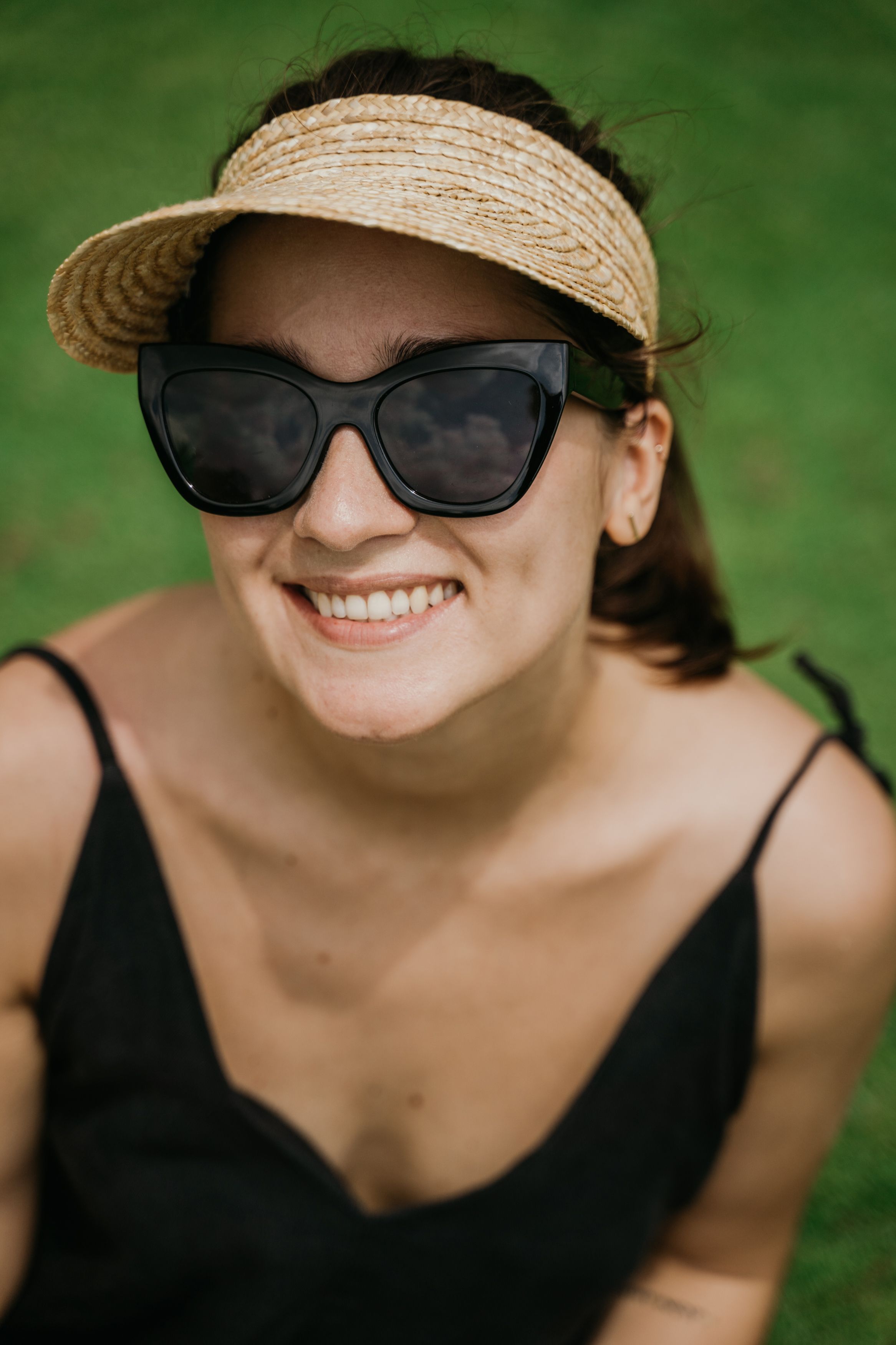 Portrait of a Pretty Woman in Black Spaghetti Strap Top Wearing ...