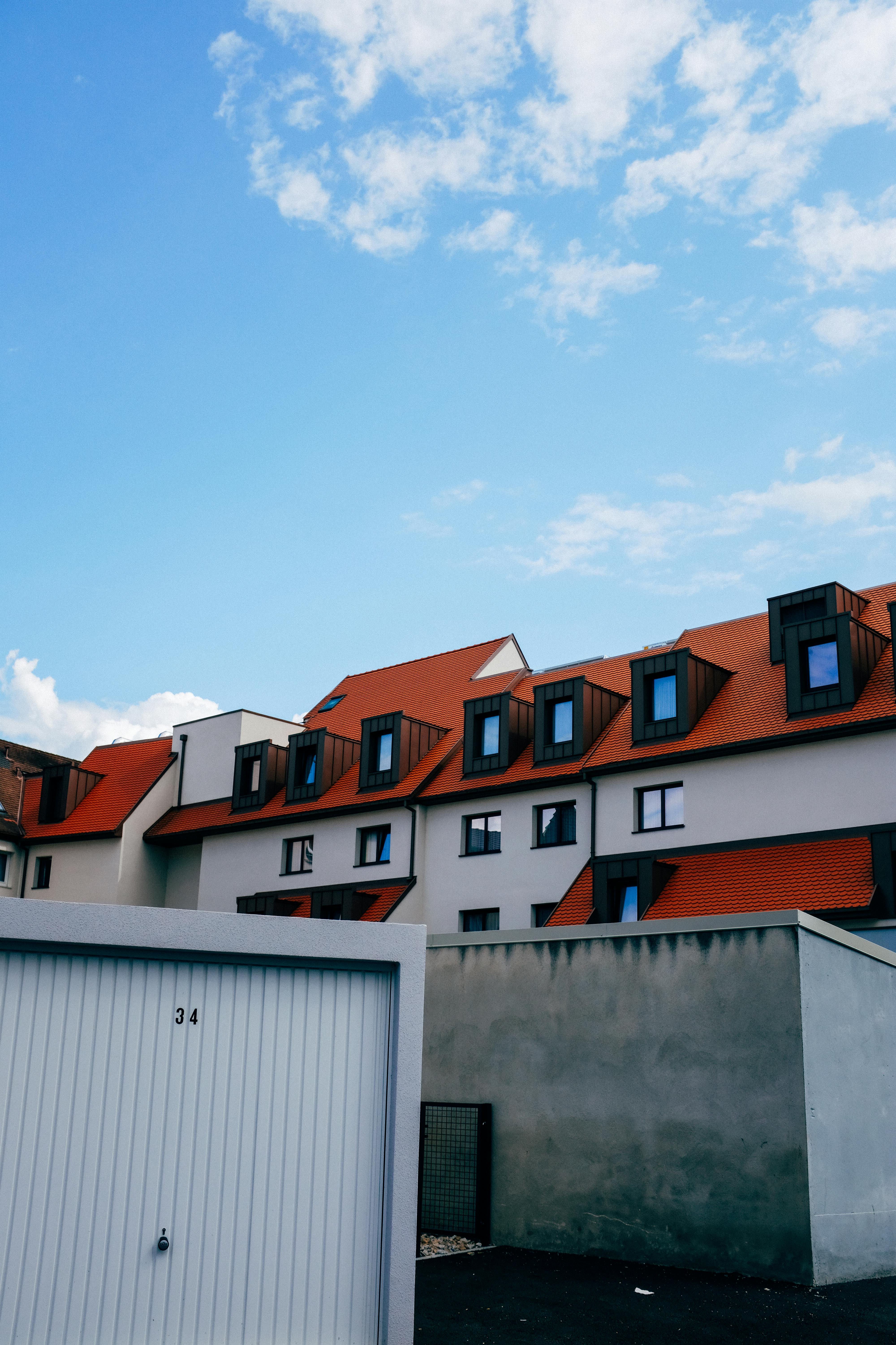 Facade of building with orange roof · Free Stock Photo