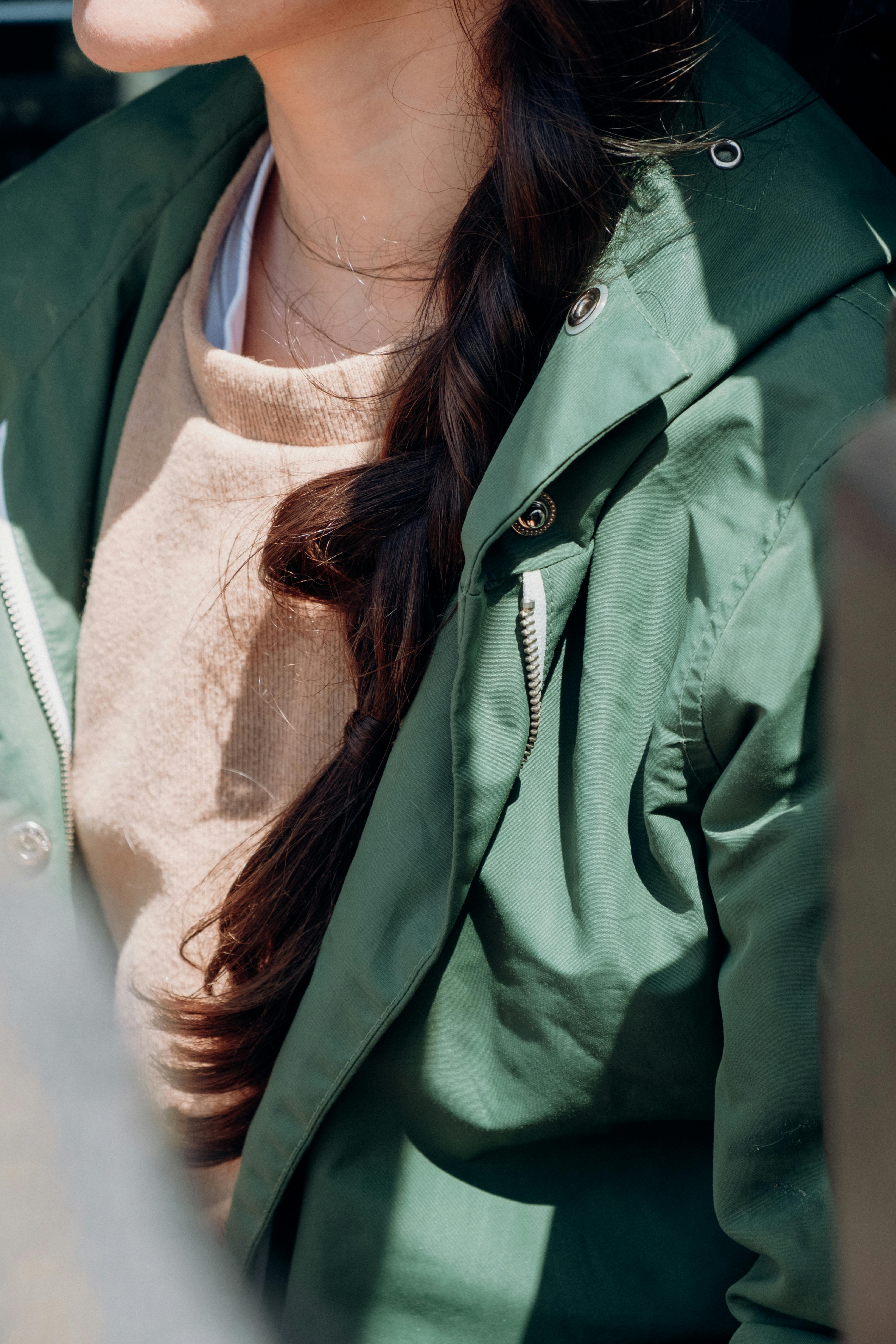 Close Up Photo of a Woman Wearing Green Jacket · Free Stock Photo