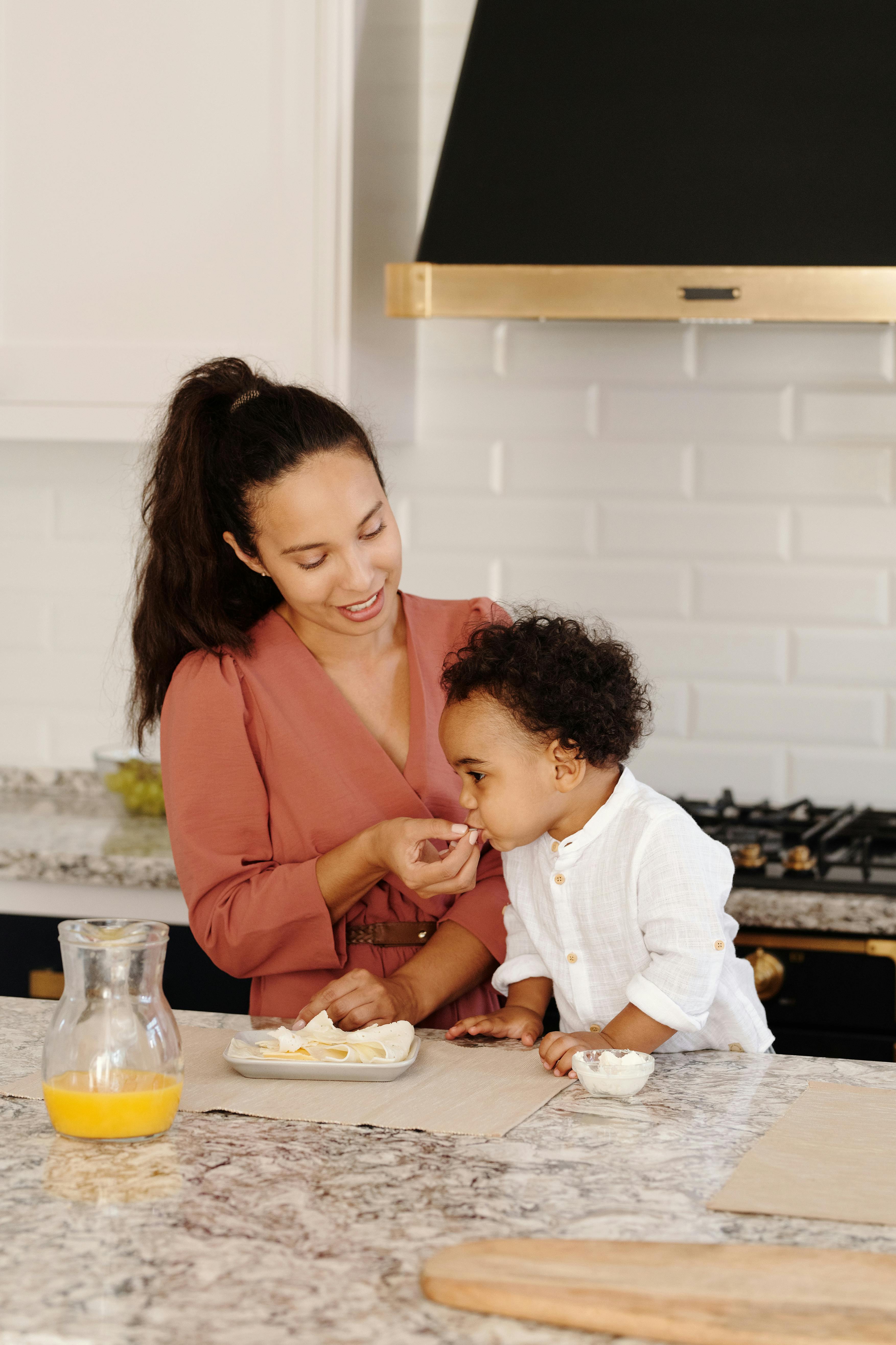 Family Making Breakfast in the Kitchen · Free Stock Photo