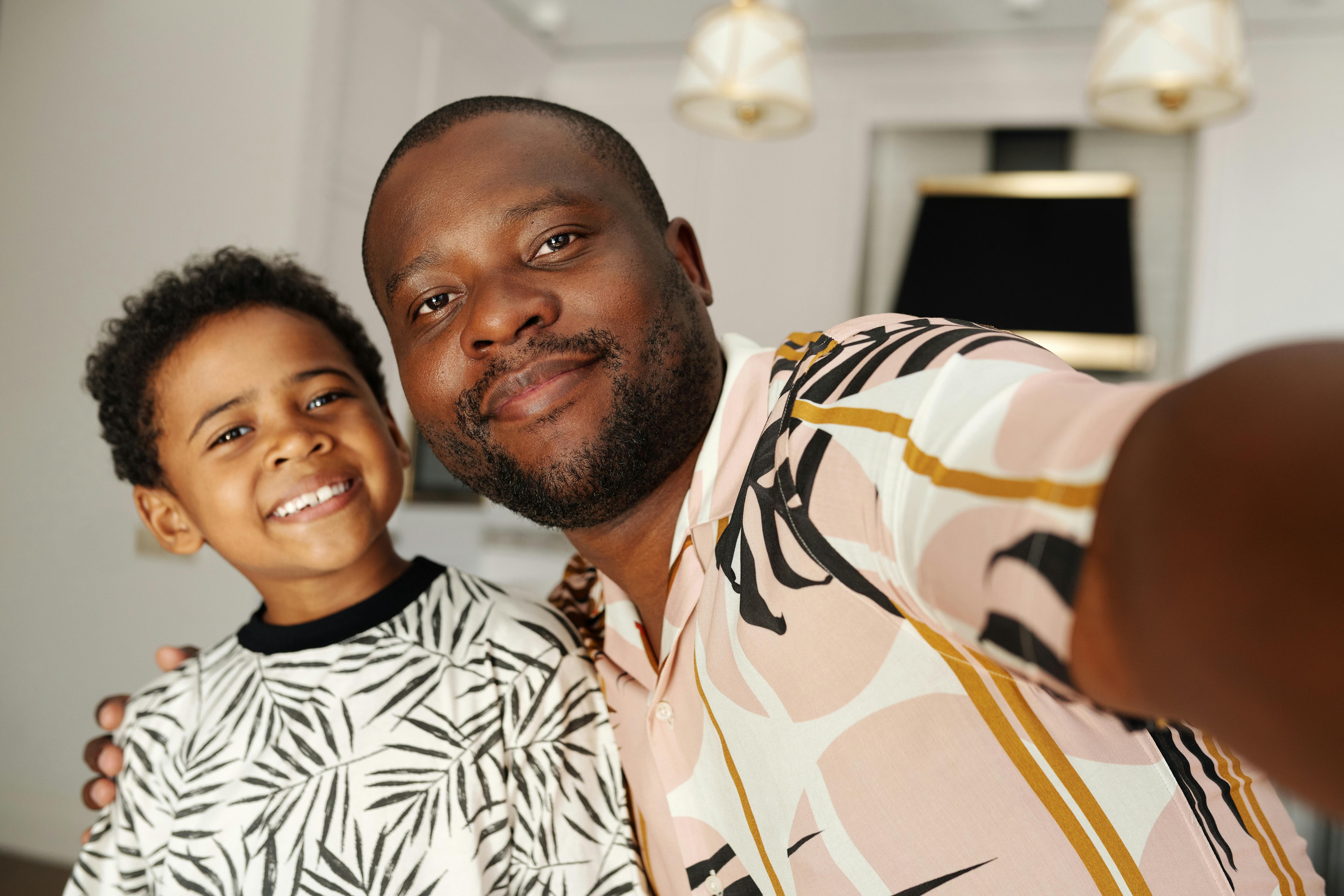 Man and Boy Smiling · Free Stock Photo