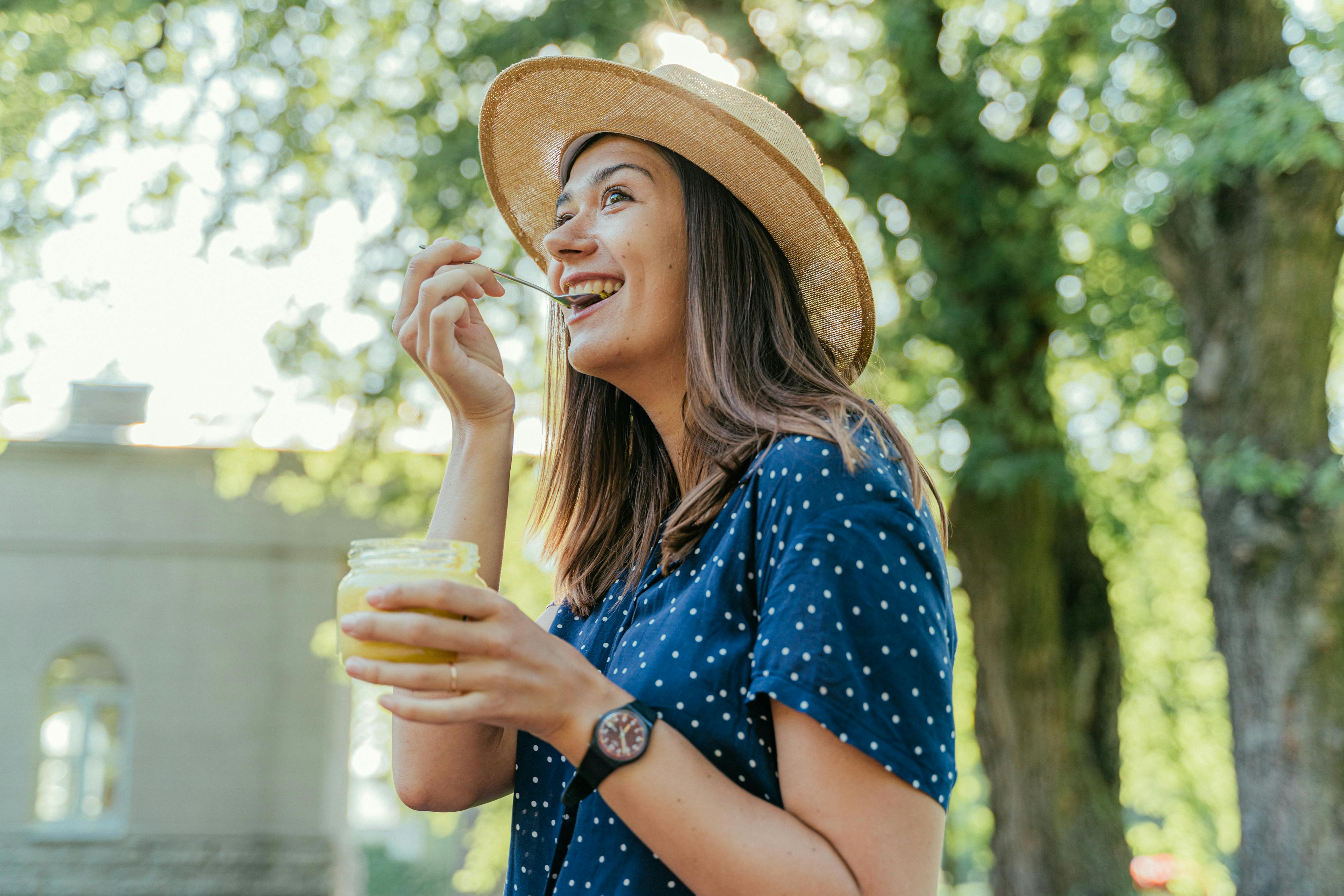 A Woman Eating Jam · Free Stock Photo