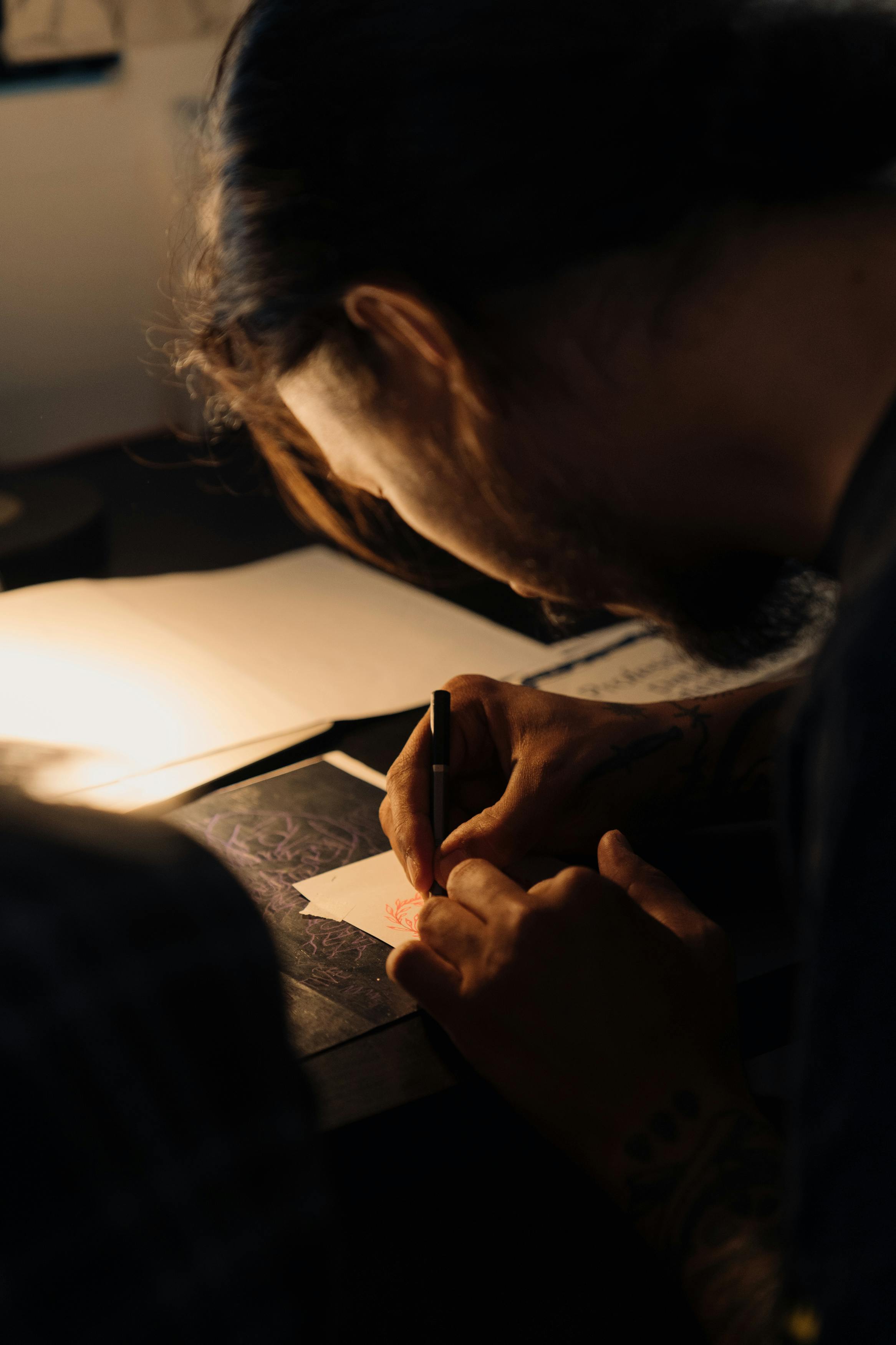 Close-Up Shot of a Person Drawing on Paper · Free Stock Photo